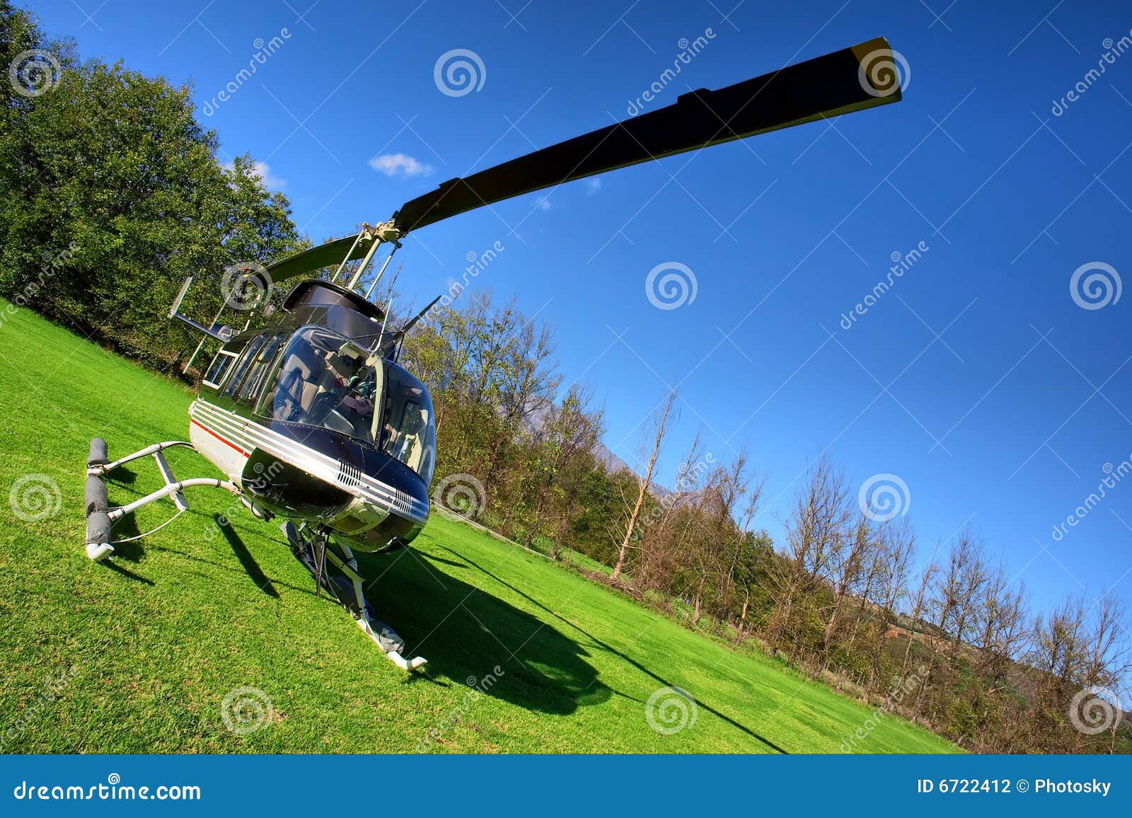 Small Private Helicopter on Grass Stock Photo - Image of cockpit ...