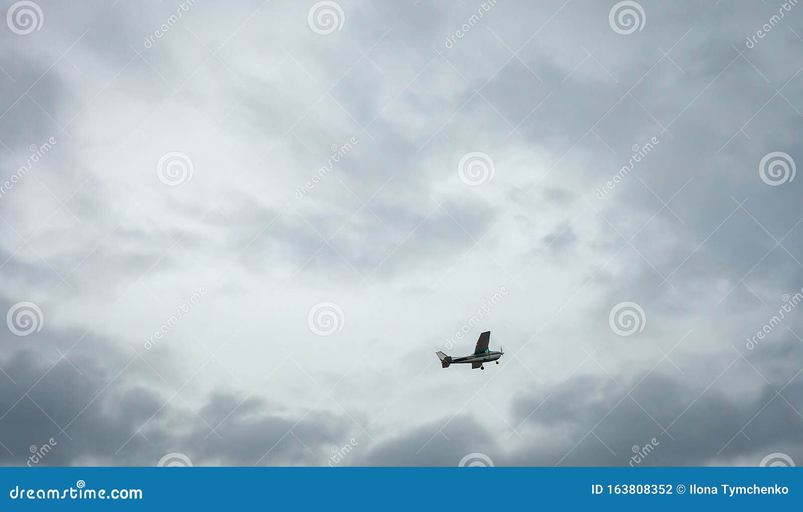 Small Private Plane Flying in Cloudy Sky. White Crop Duster Flight ...