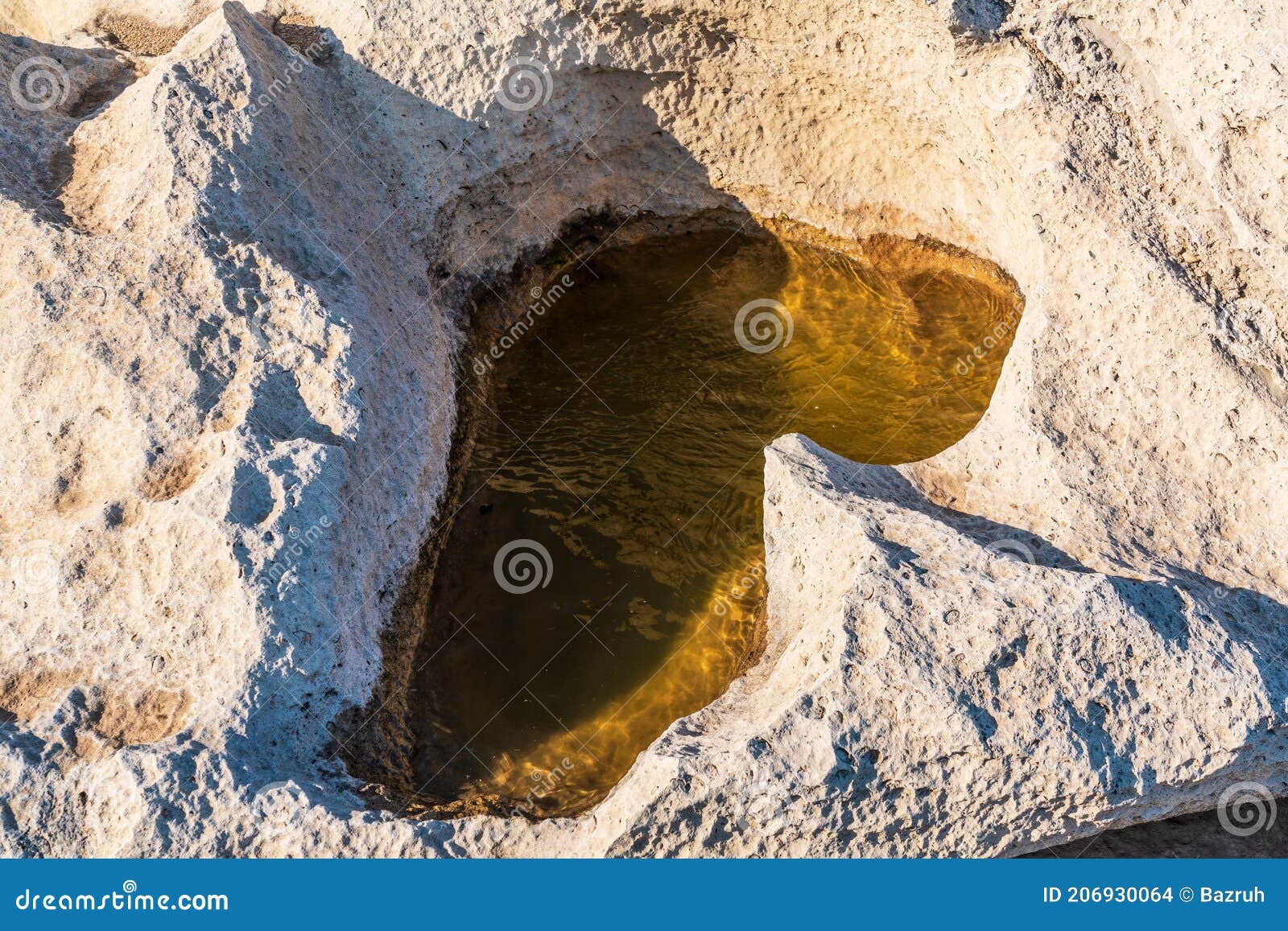 Small puddle in the rock stock photo. Image of wonderful - 206930064