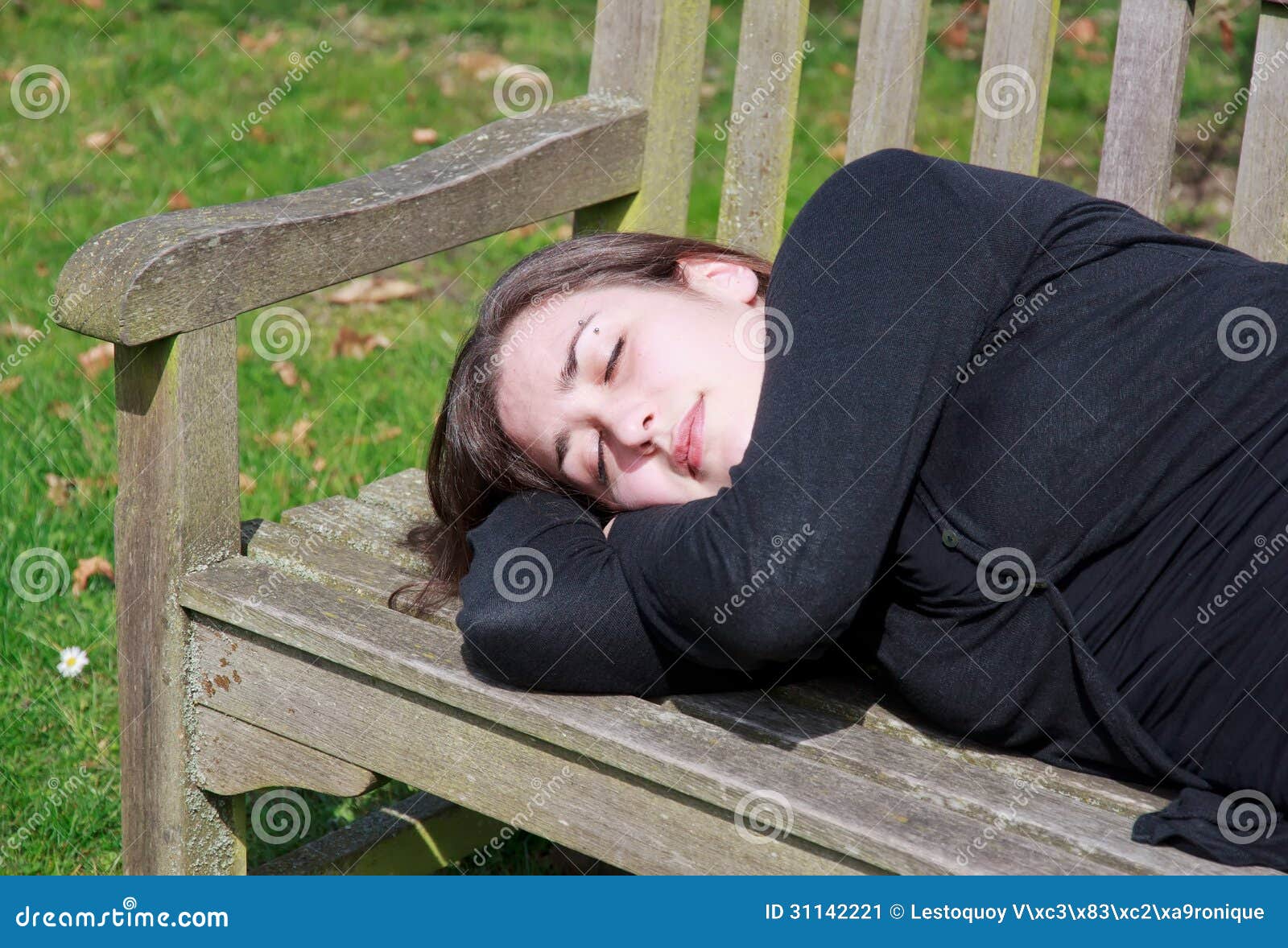 Small quiet nap on a bench stock image. Image of portrait - 31142221