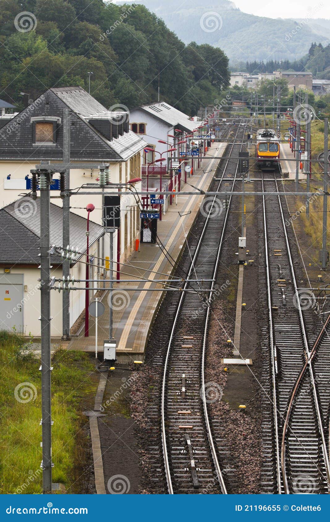 Small Railwaystation with Railroad and Train Stock Image - Image of ...