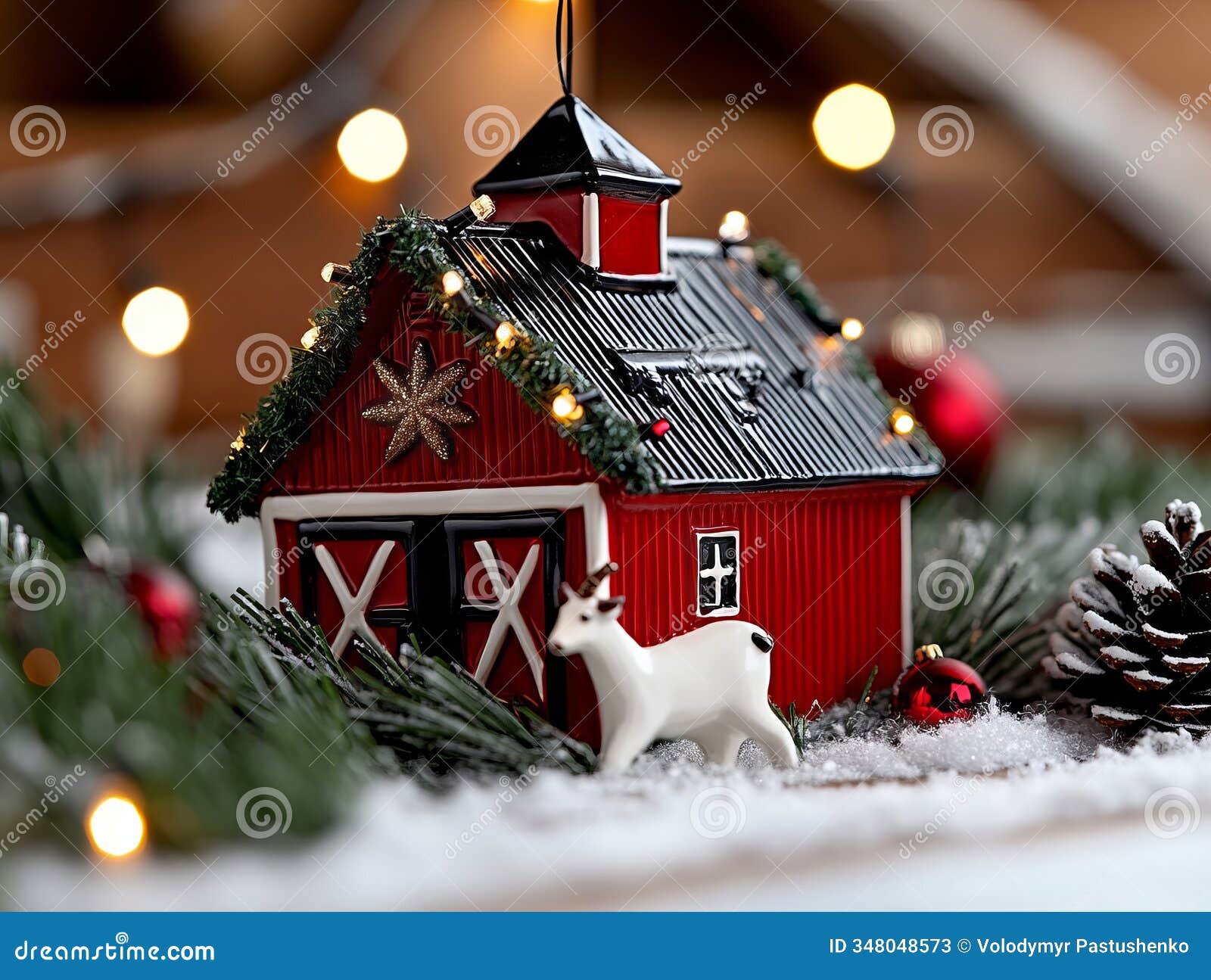A Small Red Barn with a White Reindeer in Front of it Stock Image ...
