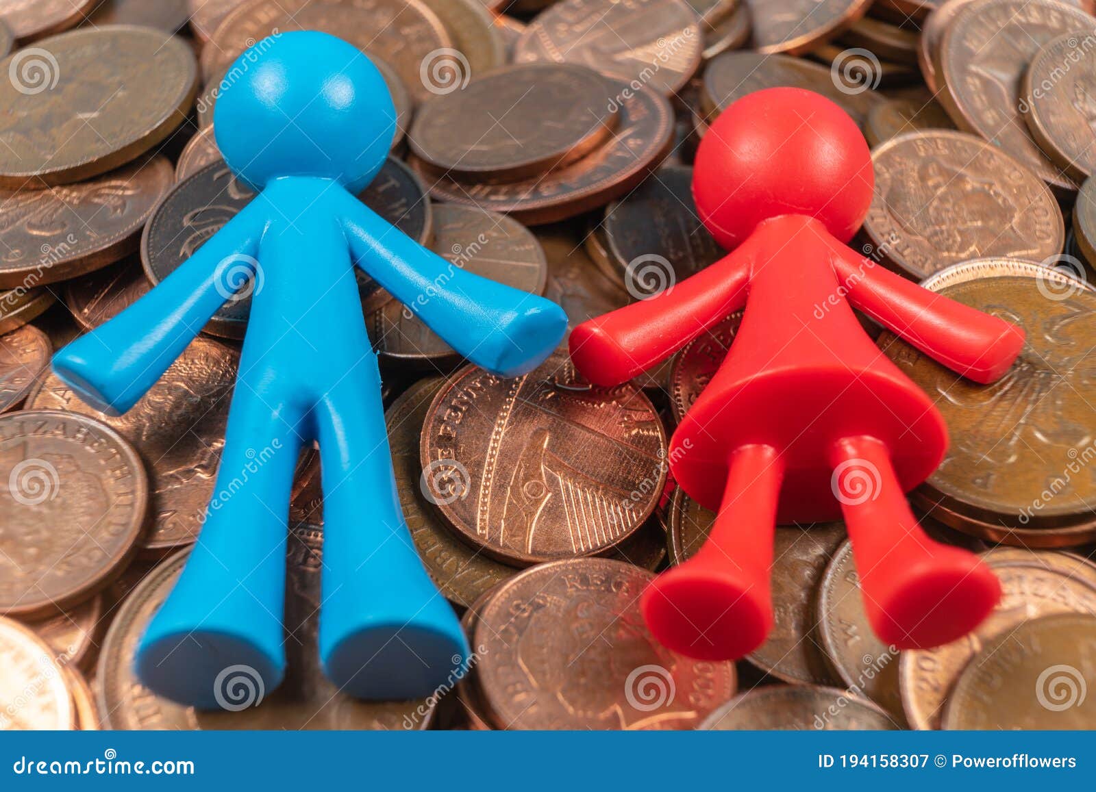 Small Red and Blue Plastic Toy Cople. Plastic Figures Lying on a Pile ...