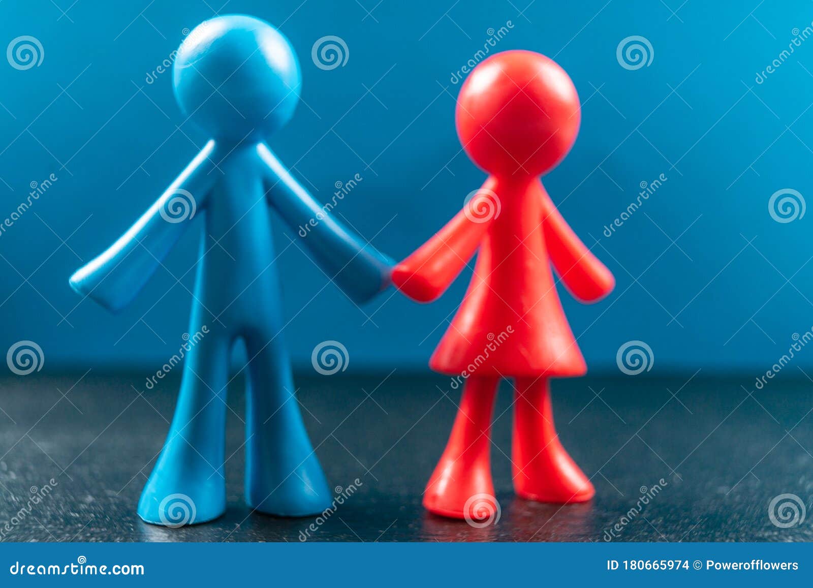 Small Red and Blue Plastic Toy CopleFigurines of an Couple Stock Photo ...