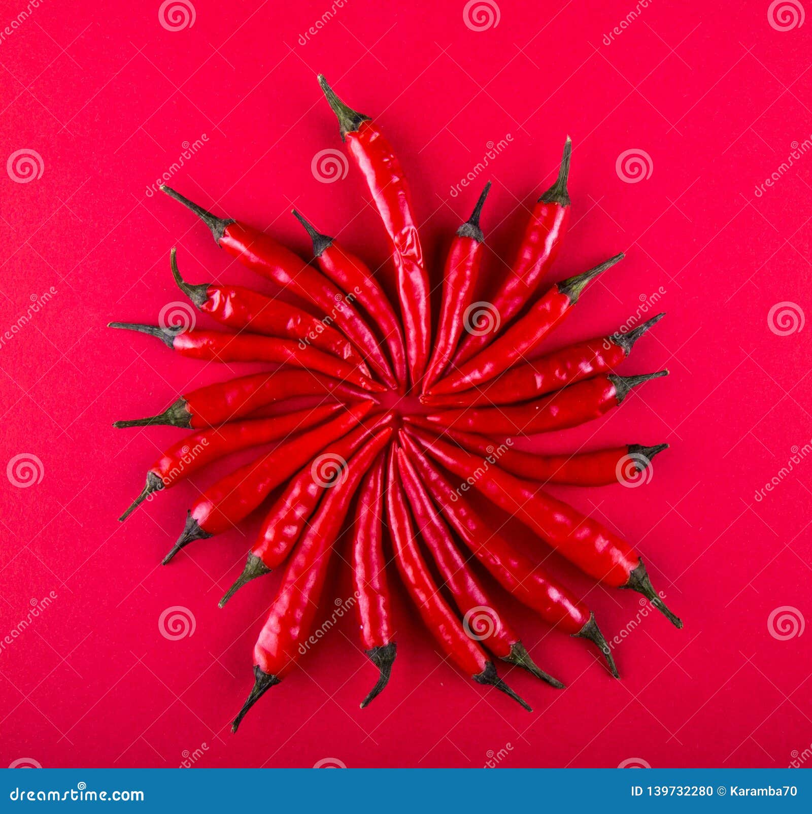 Small Red Chili Peppers in Circle Shape Over on Red Background. Flat ...