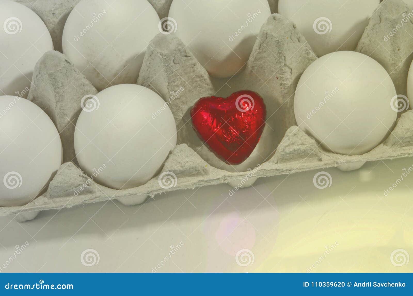 Small Red Heart in a White Egg Shell on a Blue Background Stock Photo ...