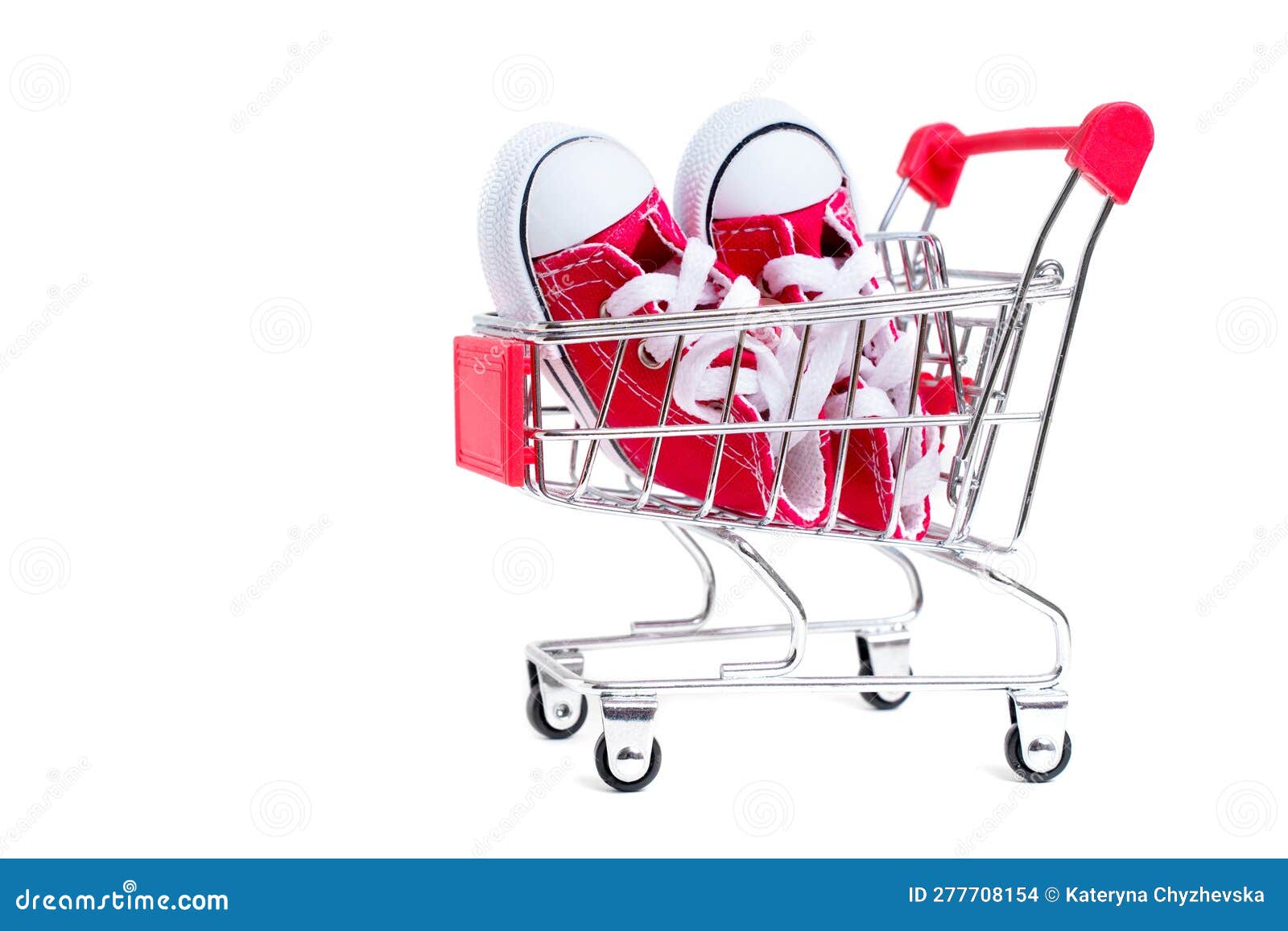 Small Red High-Top Canvas Shoes in a Miniature Sopping Trolley Stock ...