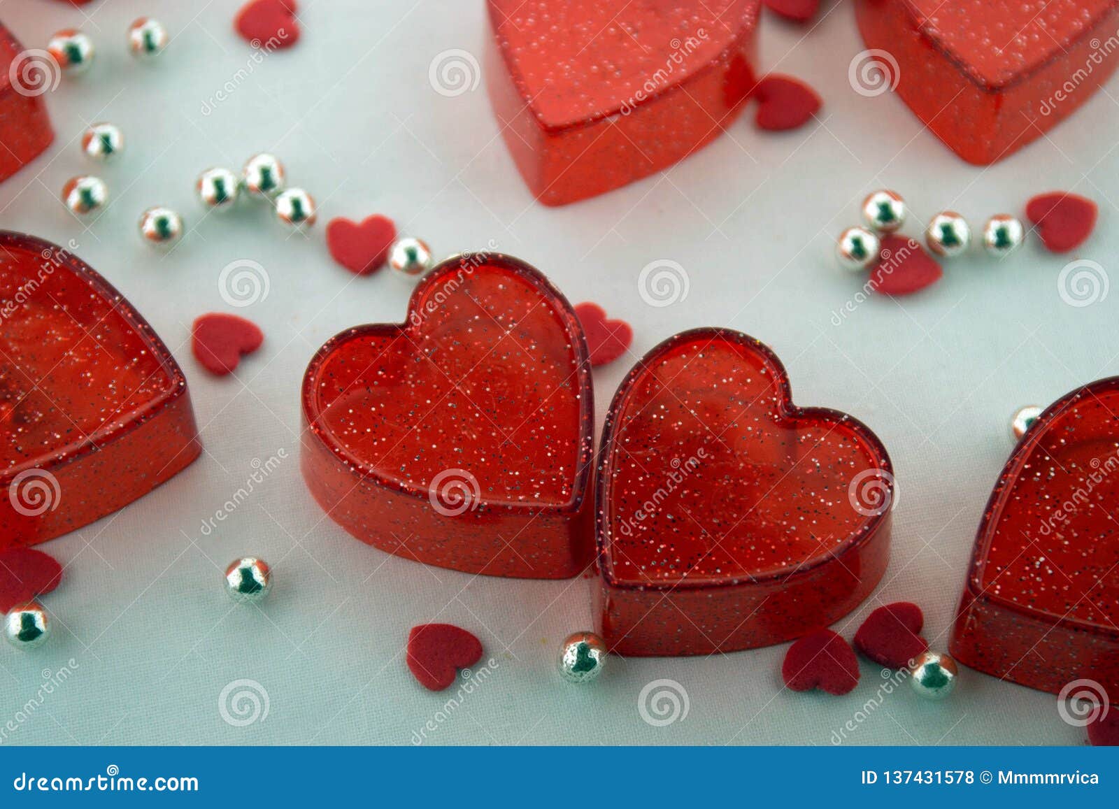 Small Red Plastic Hearts with Bright Dots and Tiny Red Hearts. Stock ...