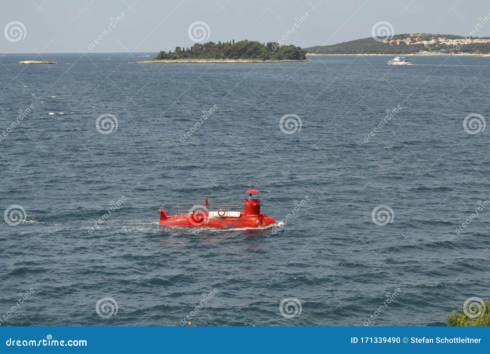 A Small Red Submarine on the Surface Stock Photo - Image of landforms ...