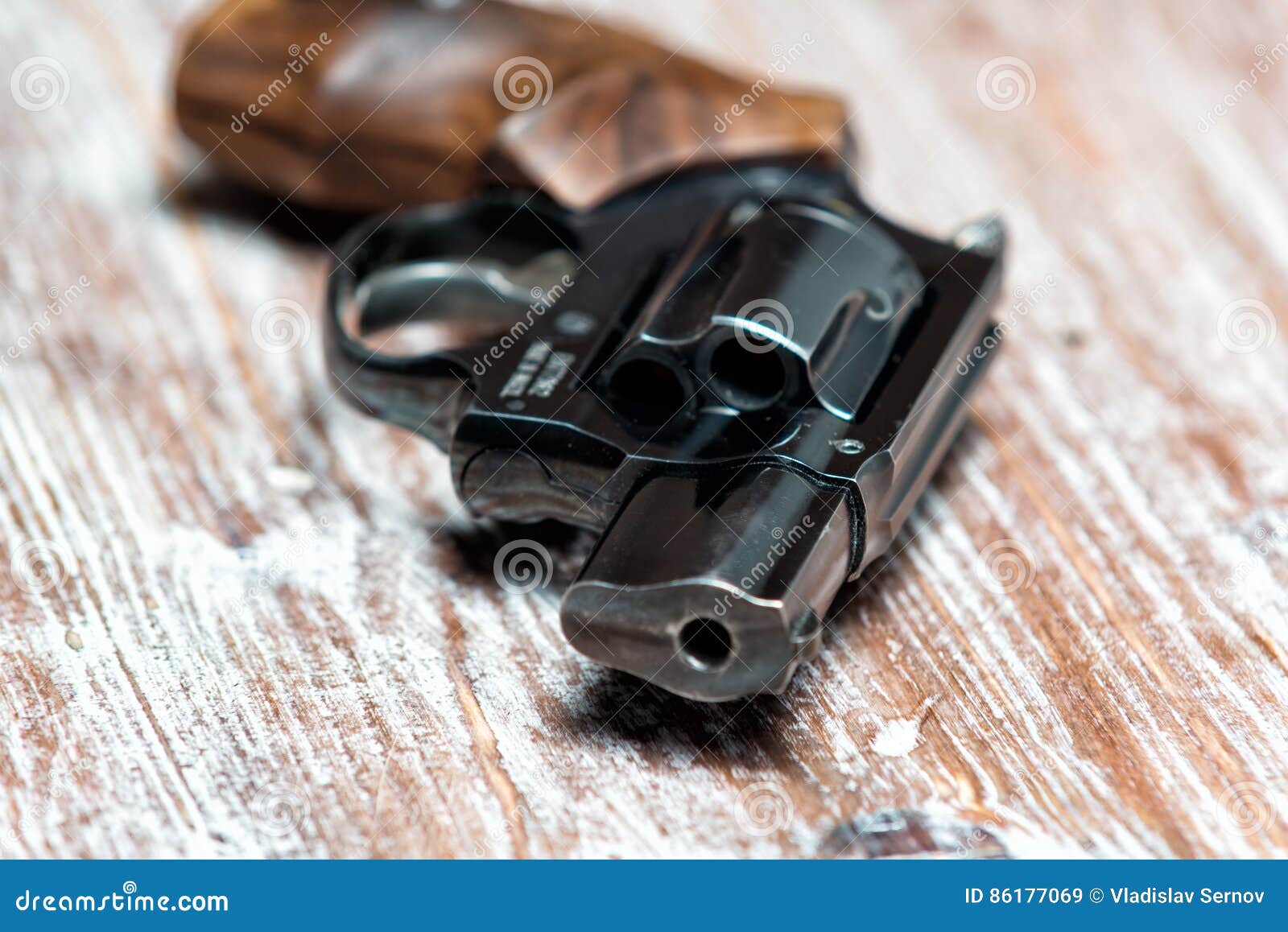 Small Revolver Lying on a Table Stock Image - Image of metal, safety ...