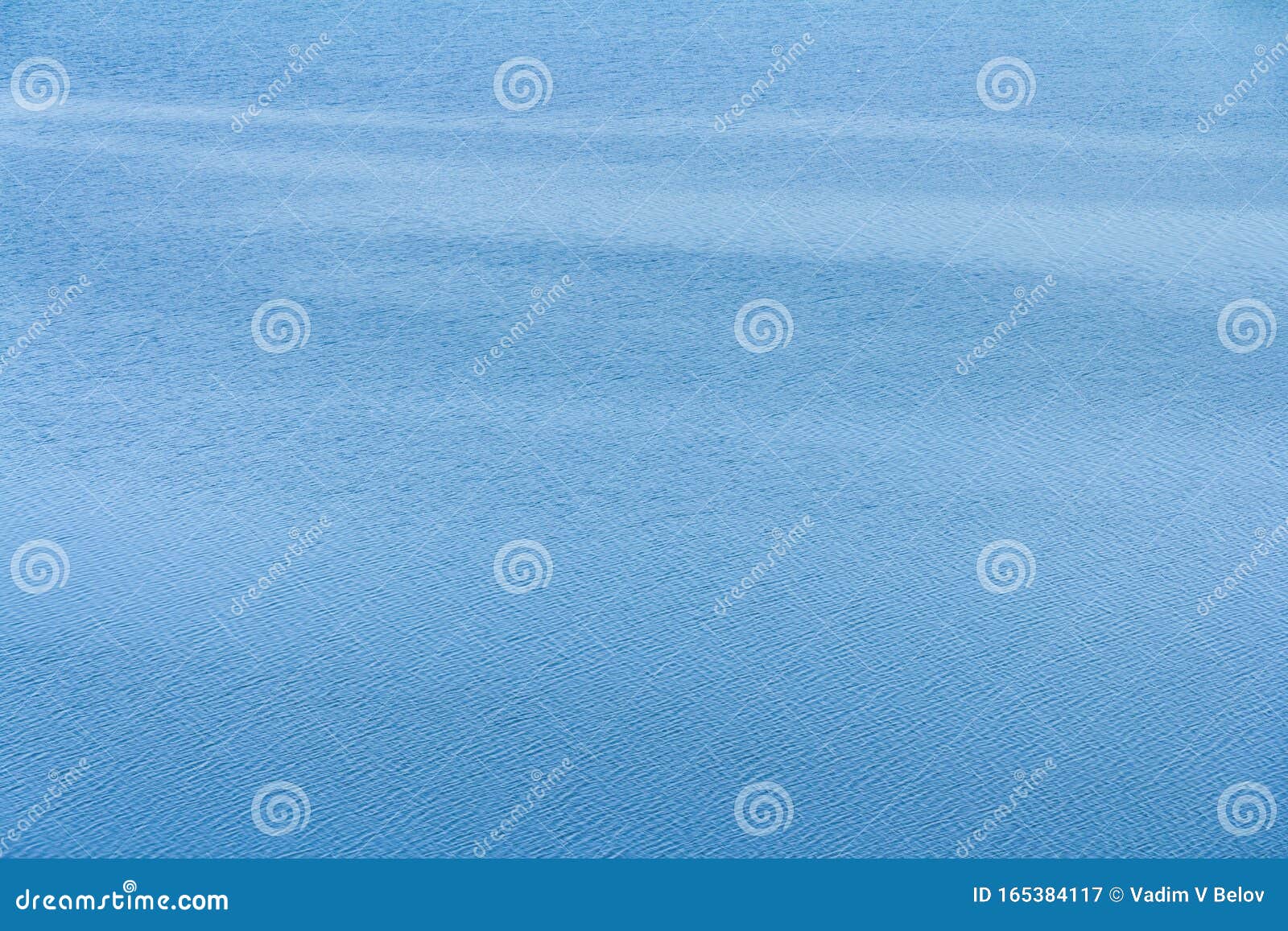 Small Ripples on the Water. Blue Background. Stock Image - Image of ...