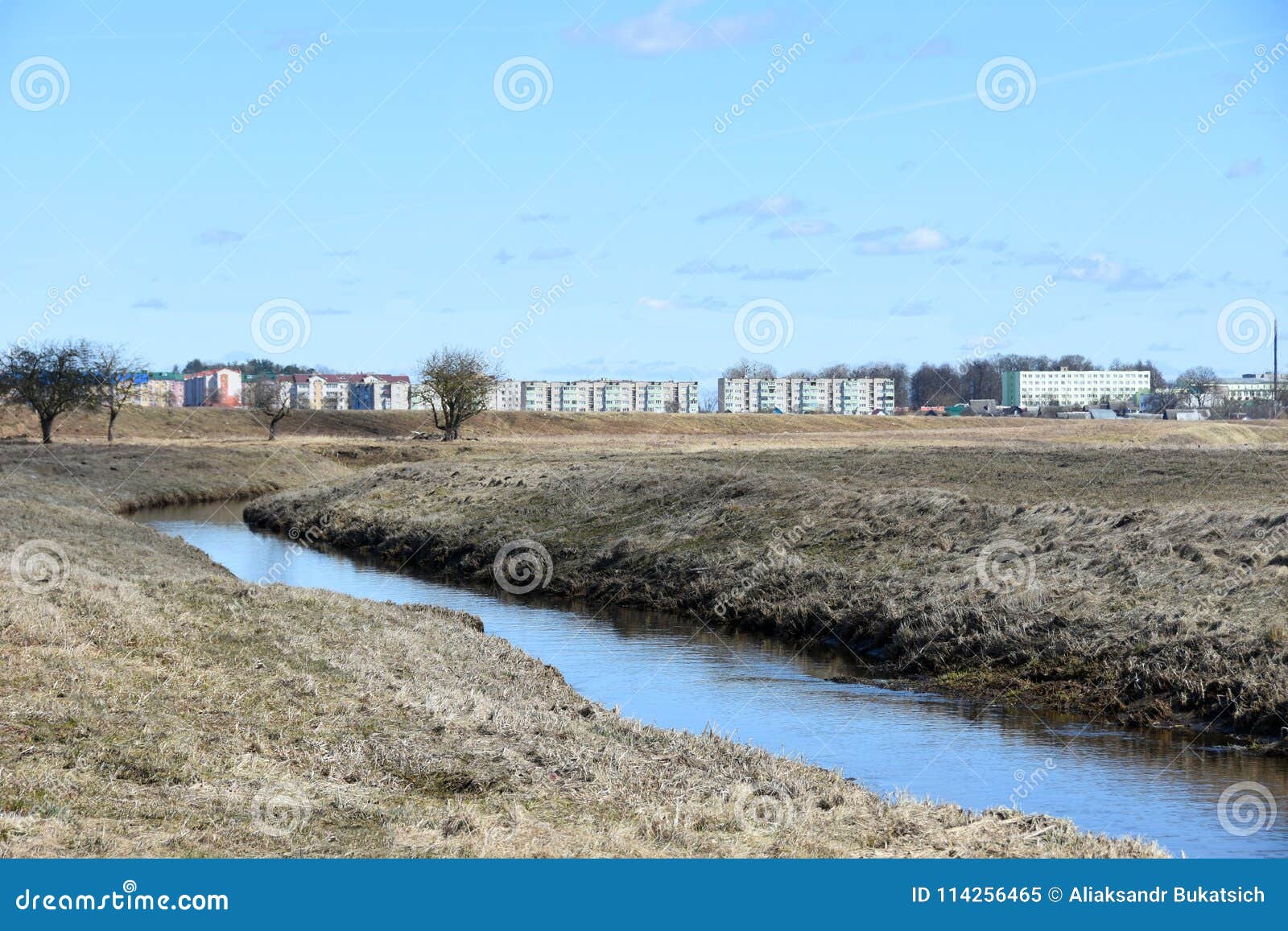 A Small River Flows Near the City in the Spring Stock Image - Image of ...
