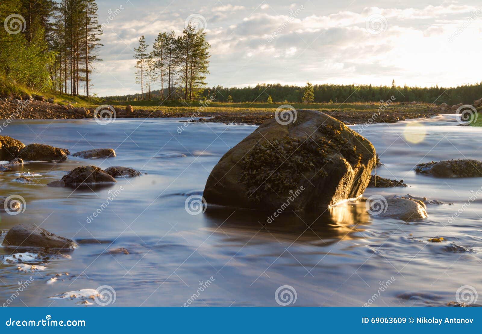Small river with sun beams stock image. Image of water - 69063609
