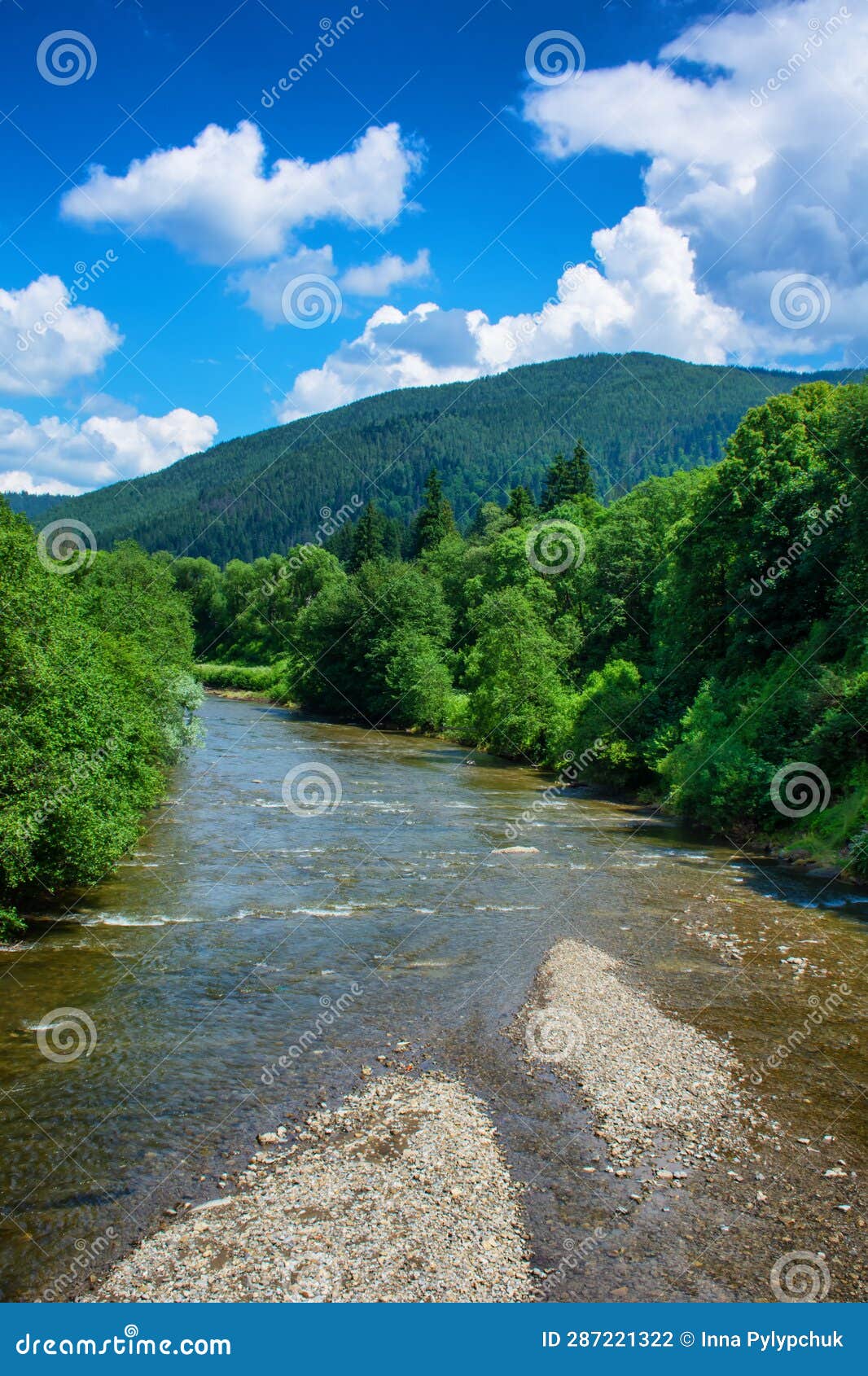A Small Rivulet Flows at the Foot of the Mountains, Vertical Photo ...