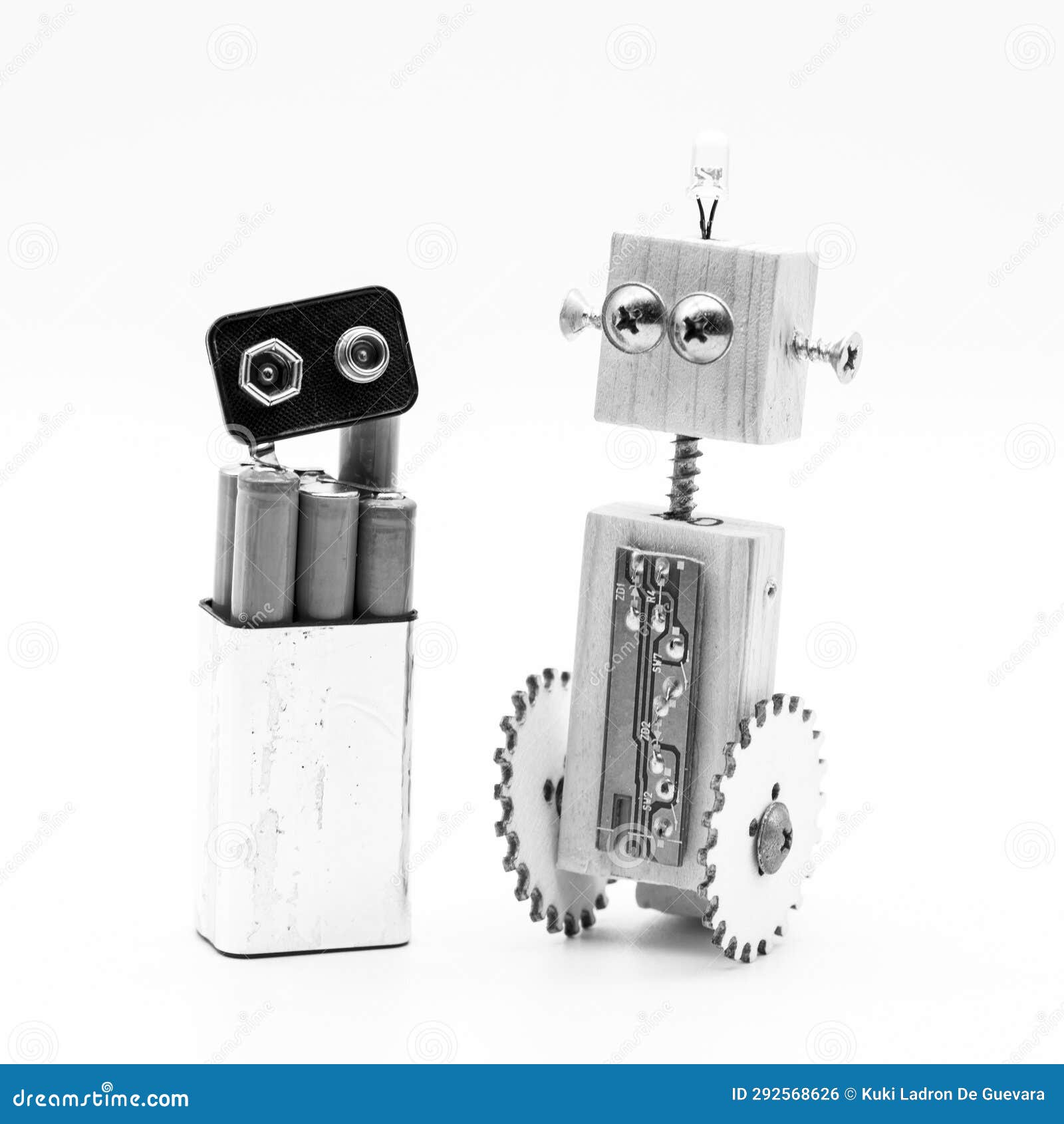Small Robot with Wheels and a Disassembled Flask Stack Stock Photo ...