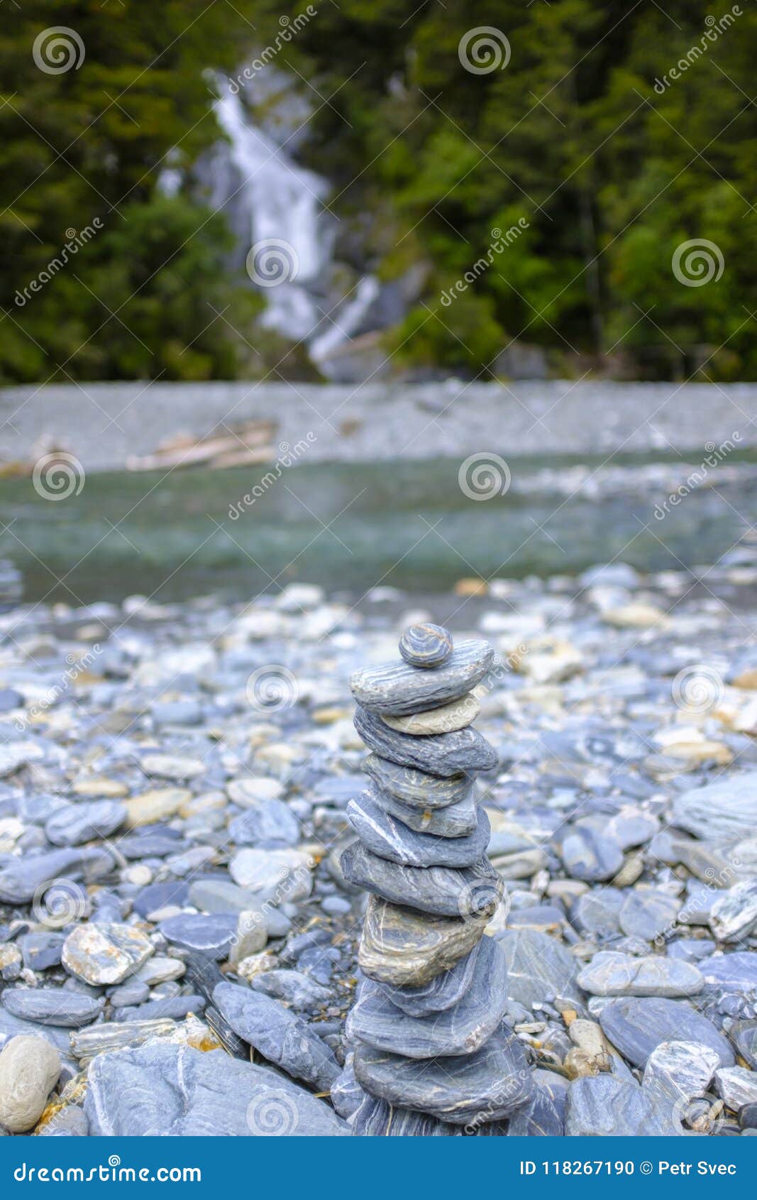 Small Rock Pile Next To a River Stock Photo - Image of meaning, river ...