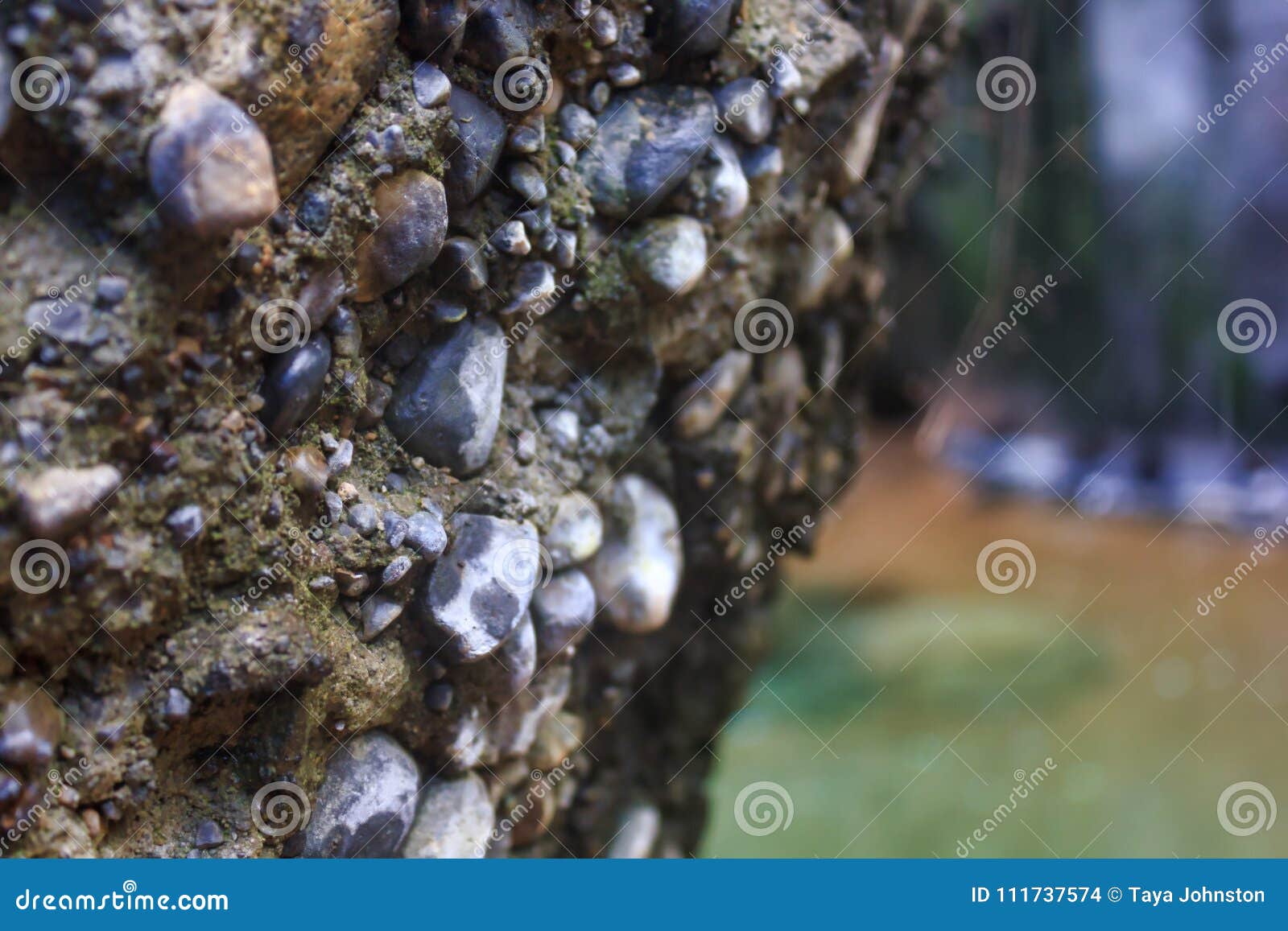 Small Rocks Imbedded in Stone Wall Stock Photo - Image of concrete ...