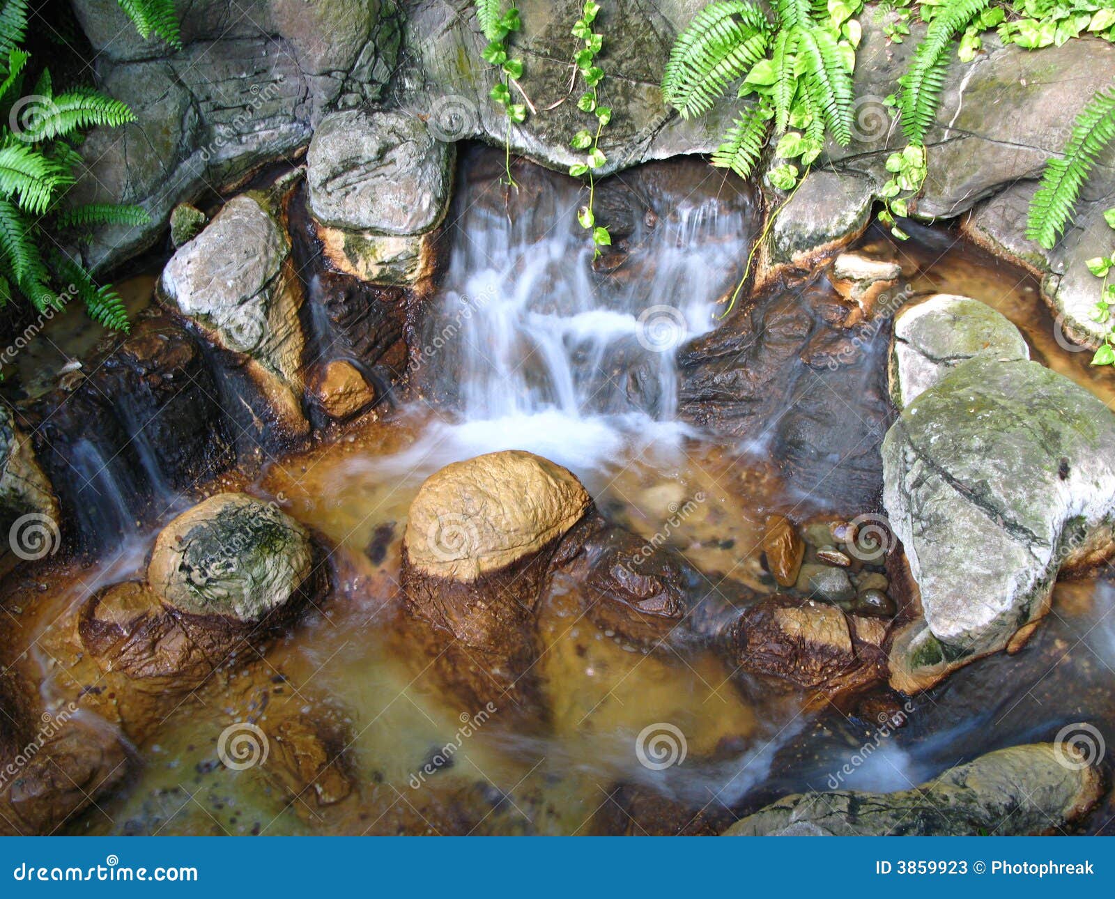 Small rocky waterfall stock image. Image of rocks, calm - 3859923