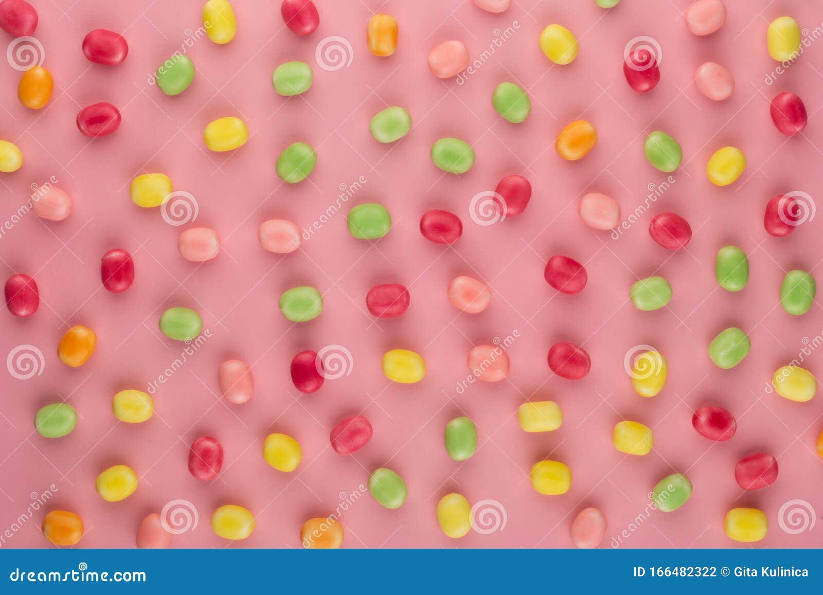 Small Round Candy-colored Pastels on Pastel Background Stock Photo ...