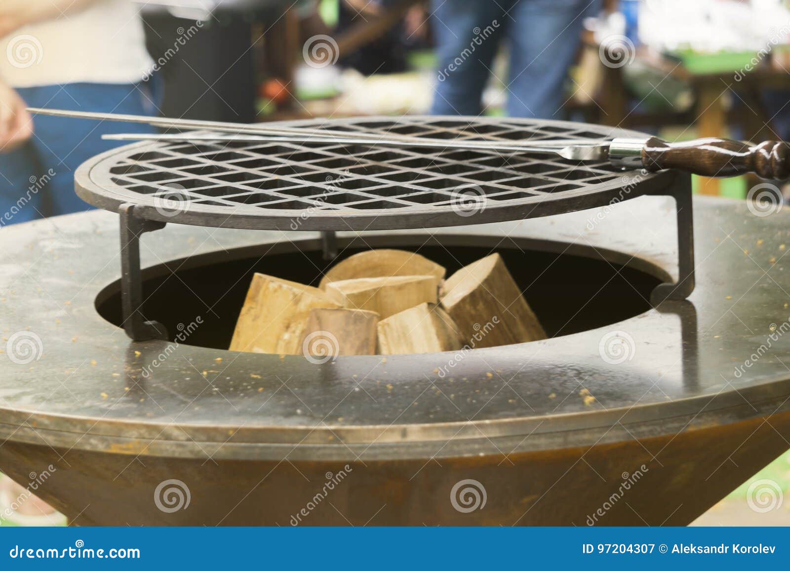 Small Round Charcoal Grill Ready for Grilling at the Summer Picnic ...