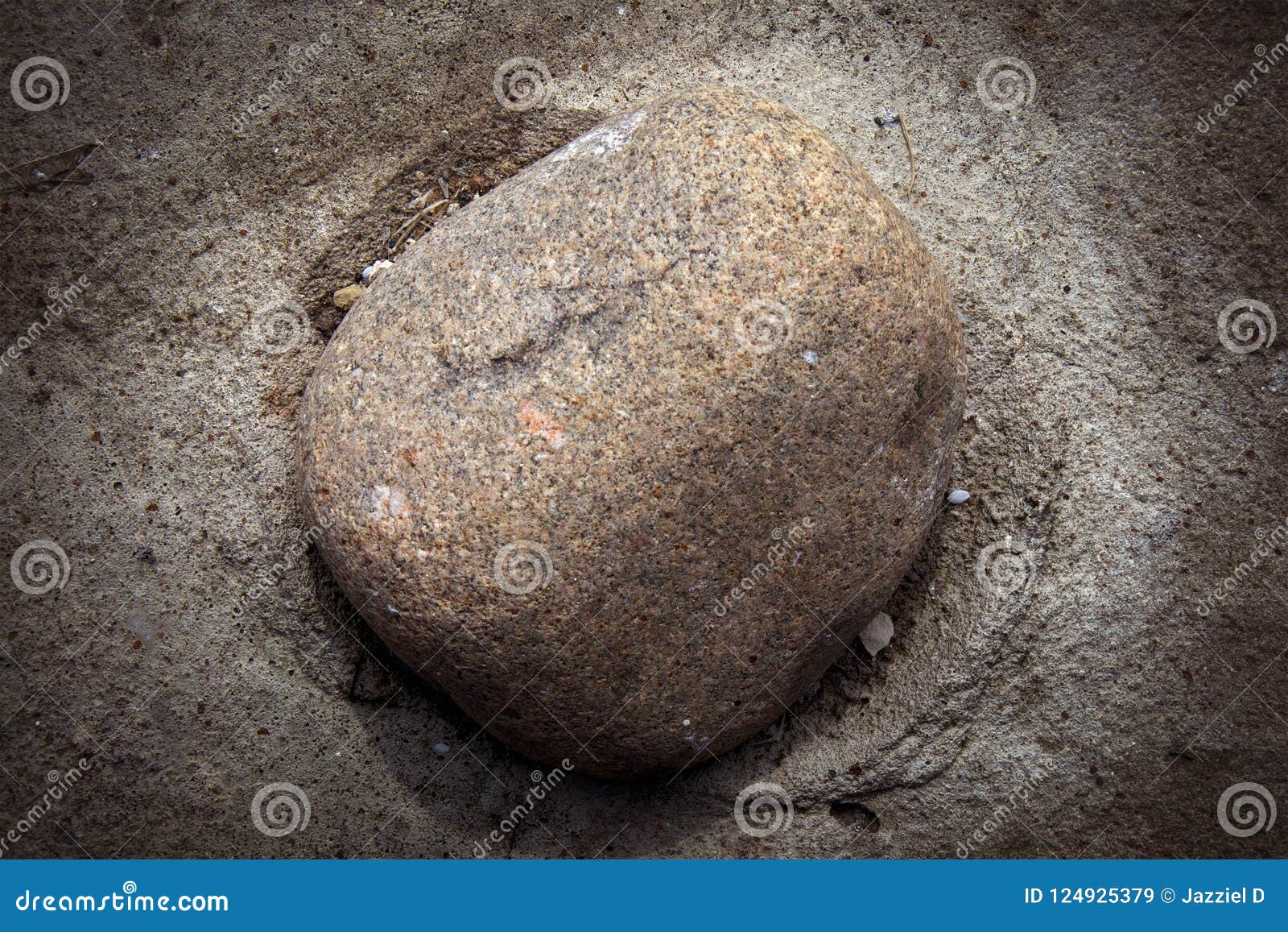 Small Round Granite Stone Half Fixed in Concrete Surface Stock Image ...