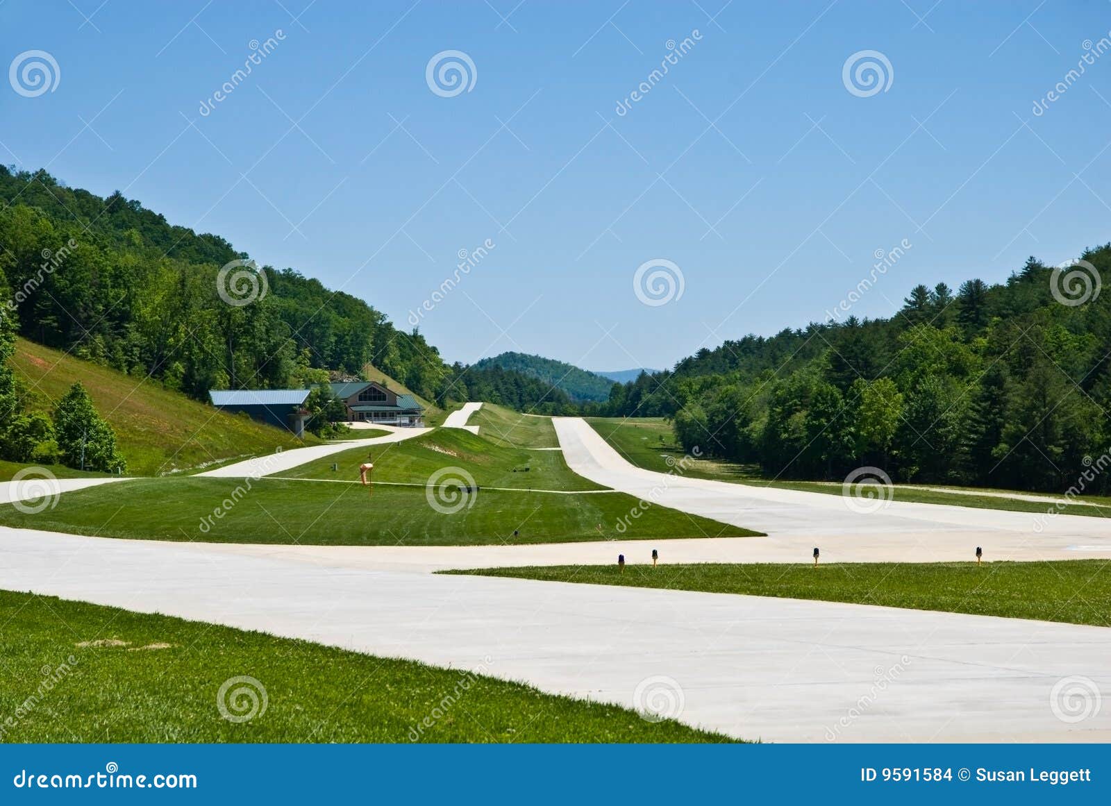 Small Runway in the Mountains Stock Photo - Image of color, business ...