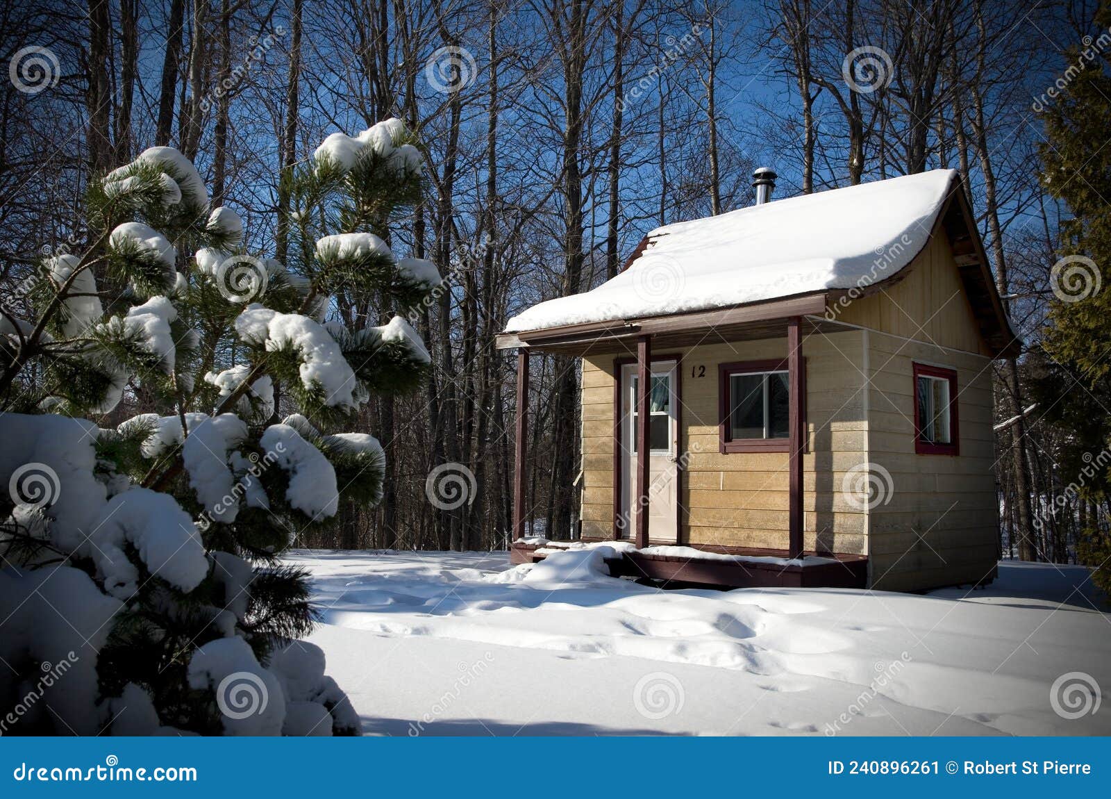 Small Rustic Cabin in Winter Used for Personal Retreat Stock Image ...