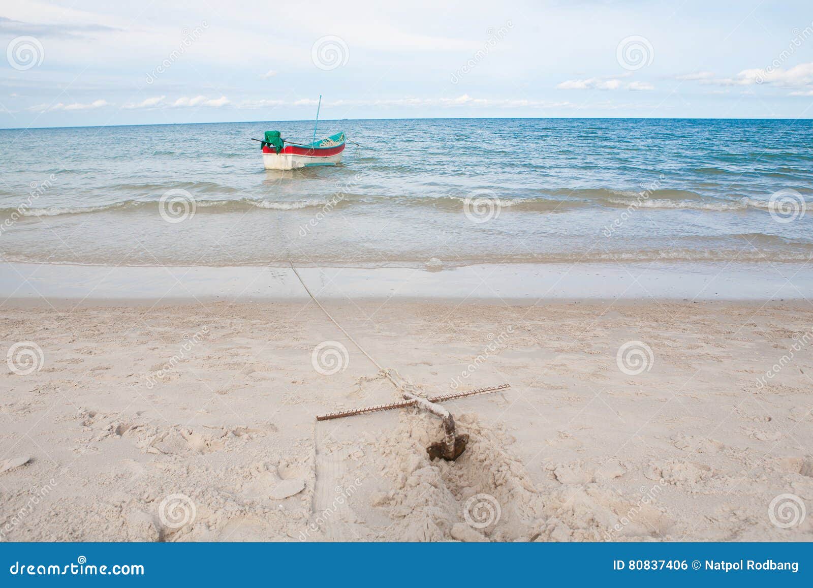 Small Rusty Traditional Anchor on a Beach by the Sea Stock Photo ...