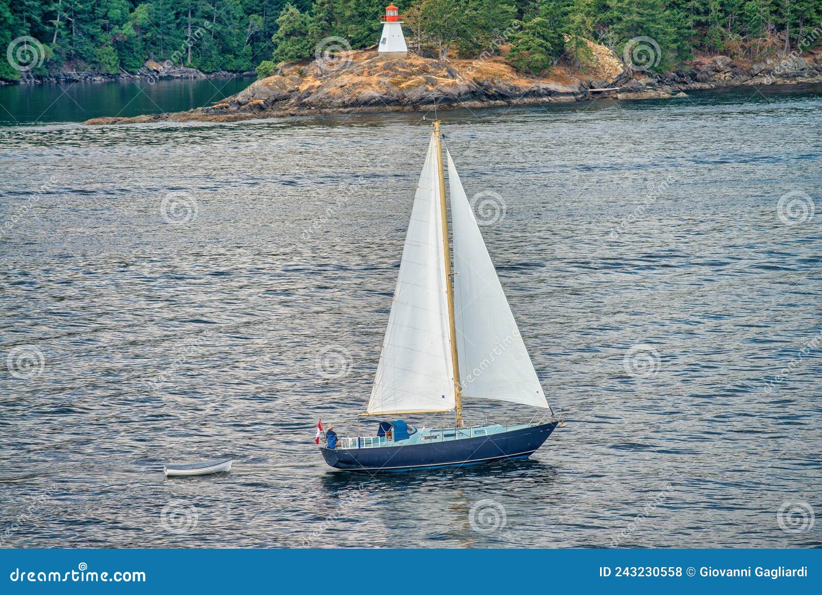 Small Sailboat Sails in the British Columbia Sound Stock Photo - Image ...