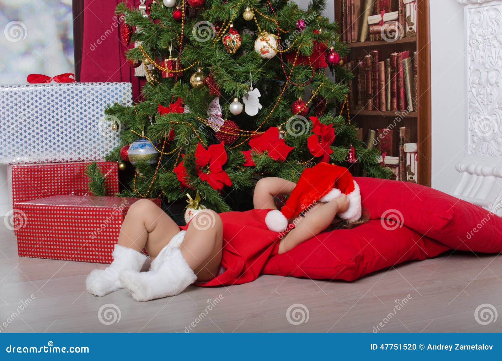 Small Santa is Resting by Christmas Tree Stock Photo - Image of girl ...