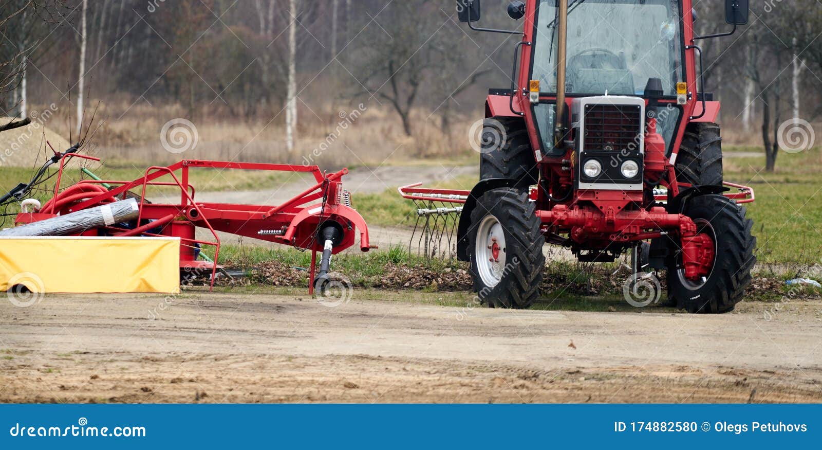Small Scale Farming with Tractor and Plow in Field Stock Photo - Image ...