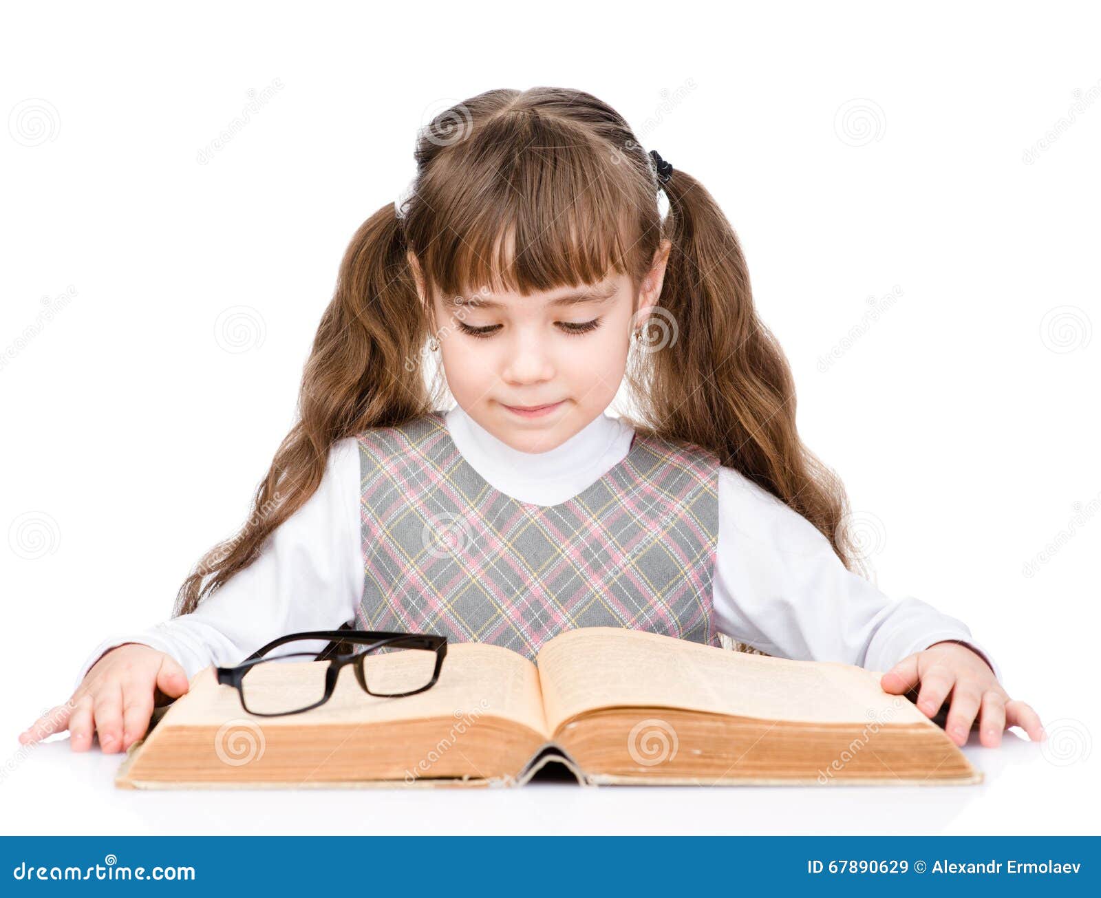 Small Schoolgirl Reading Big Book. Isolated On White Background Royalty ...