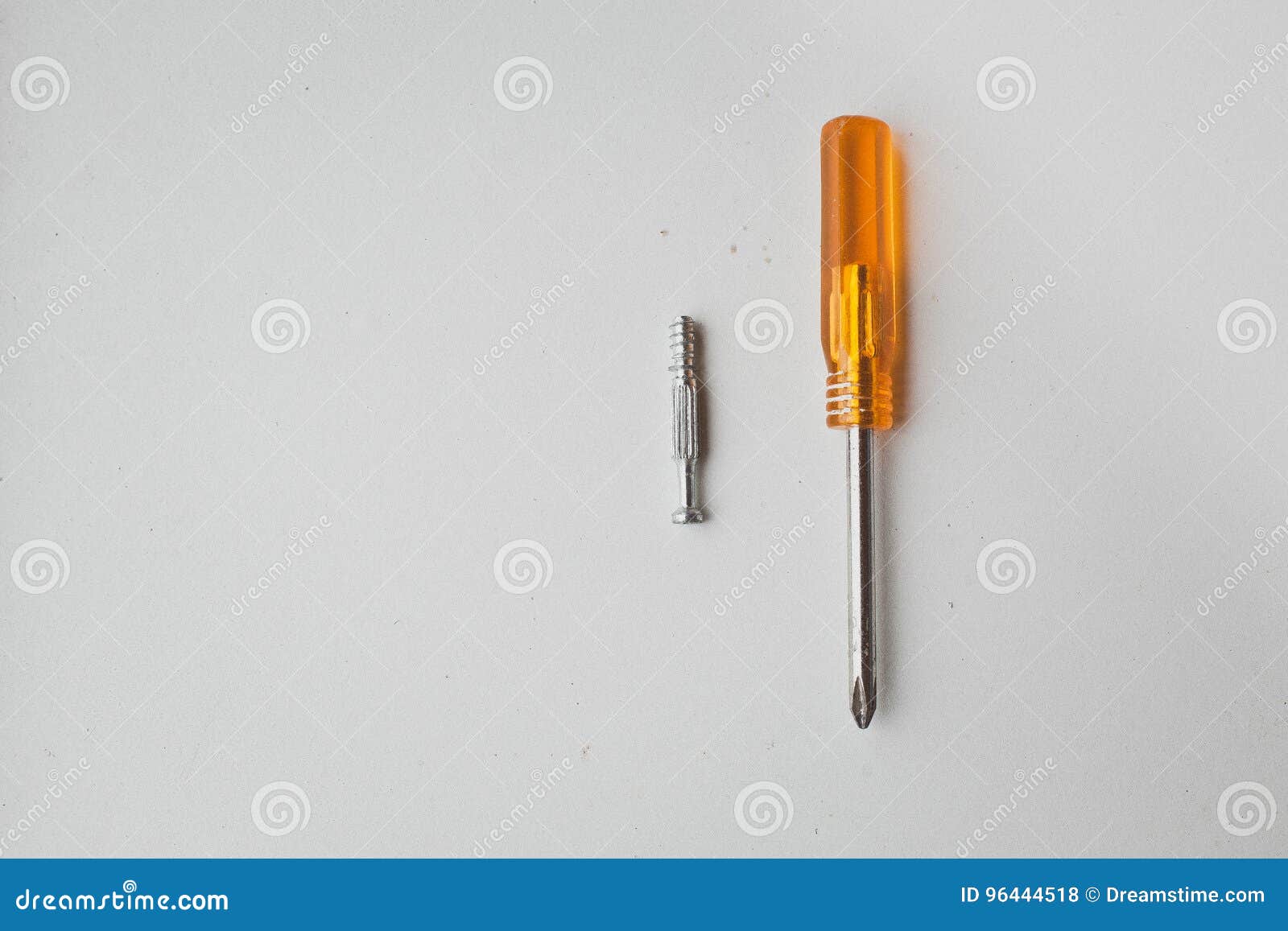 A Small Screwdriver and the Stock Photo - Image of fasteners, carpenter ...