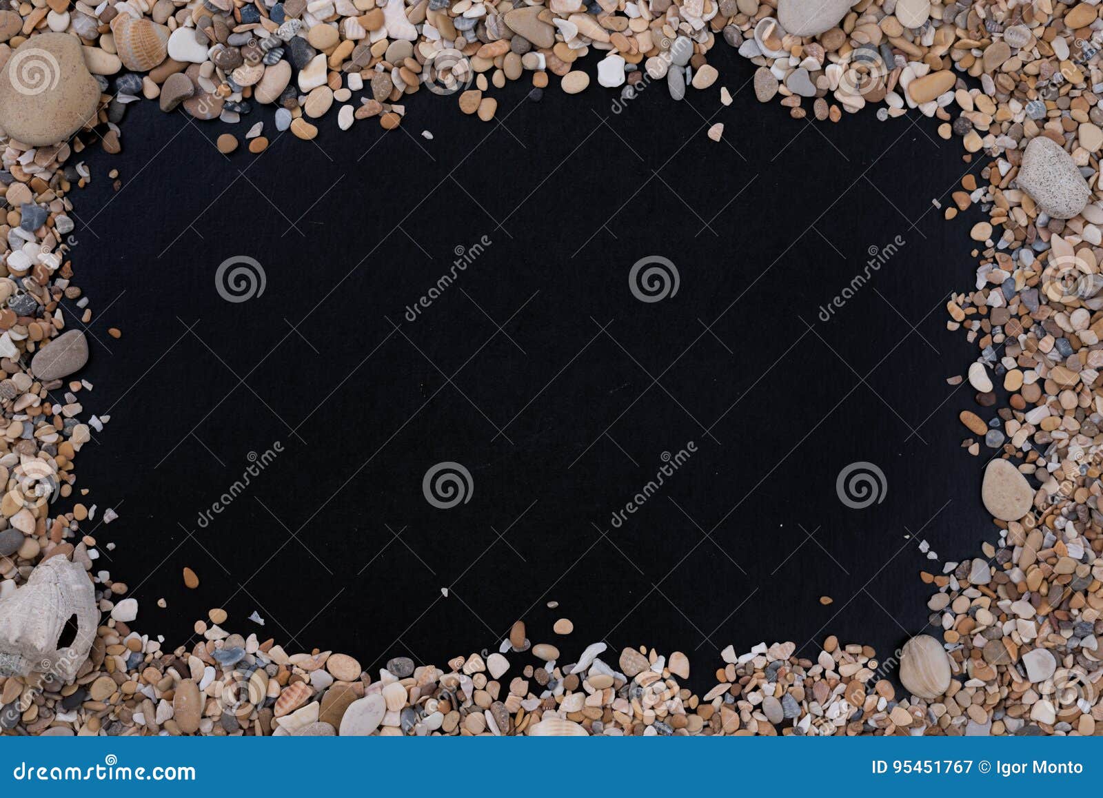 Small Sea Stones and Shells, on a Black Background, with a Free Space ...