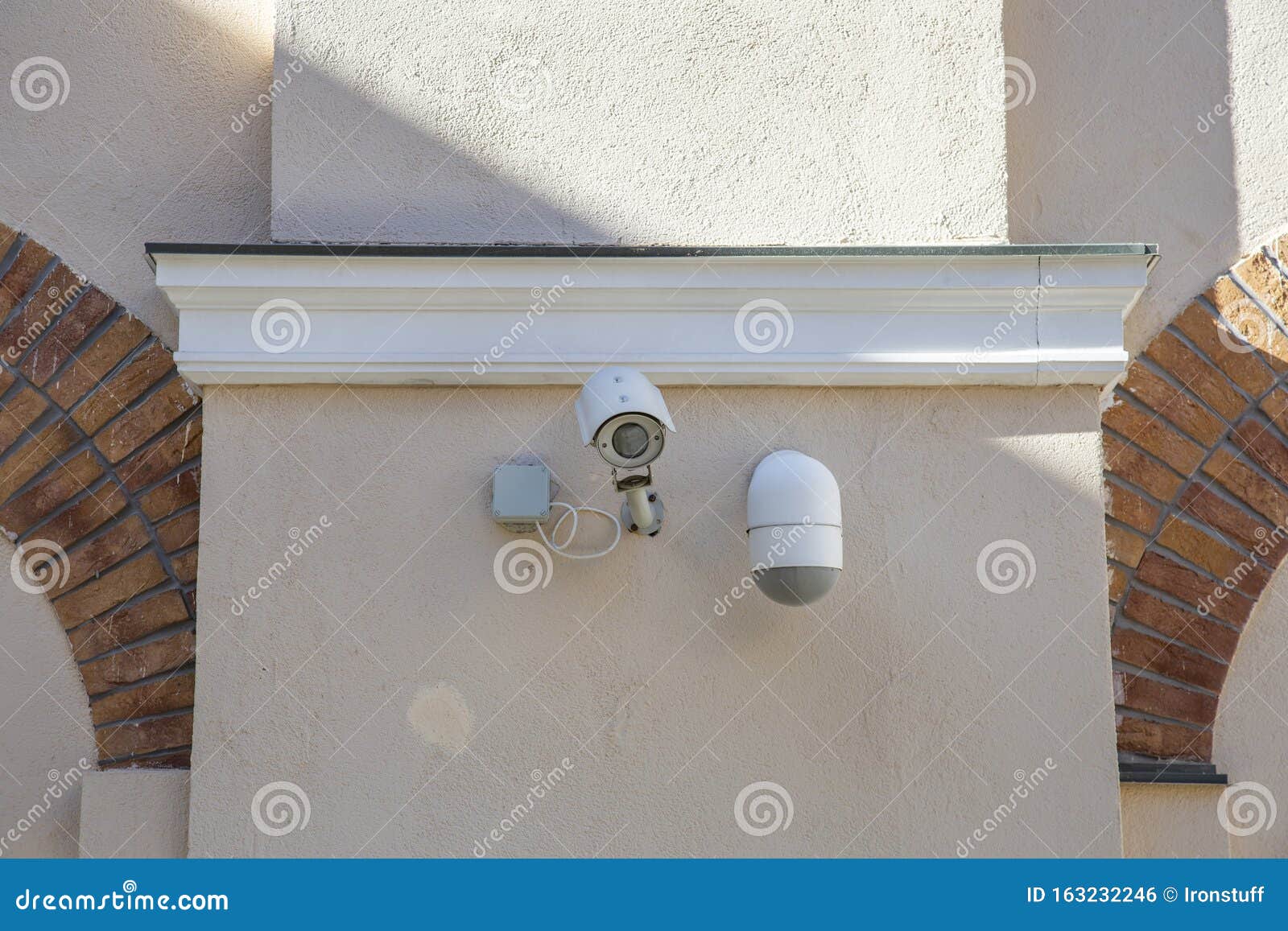 Small Security Camera on the Stone Wall Stock Photo - Image of ...