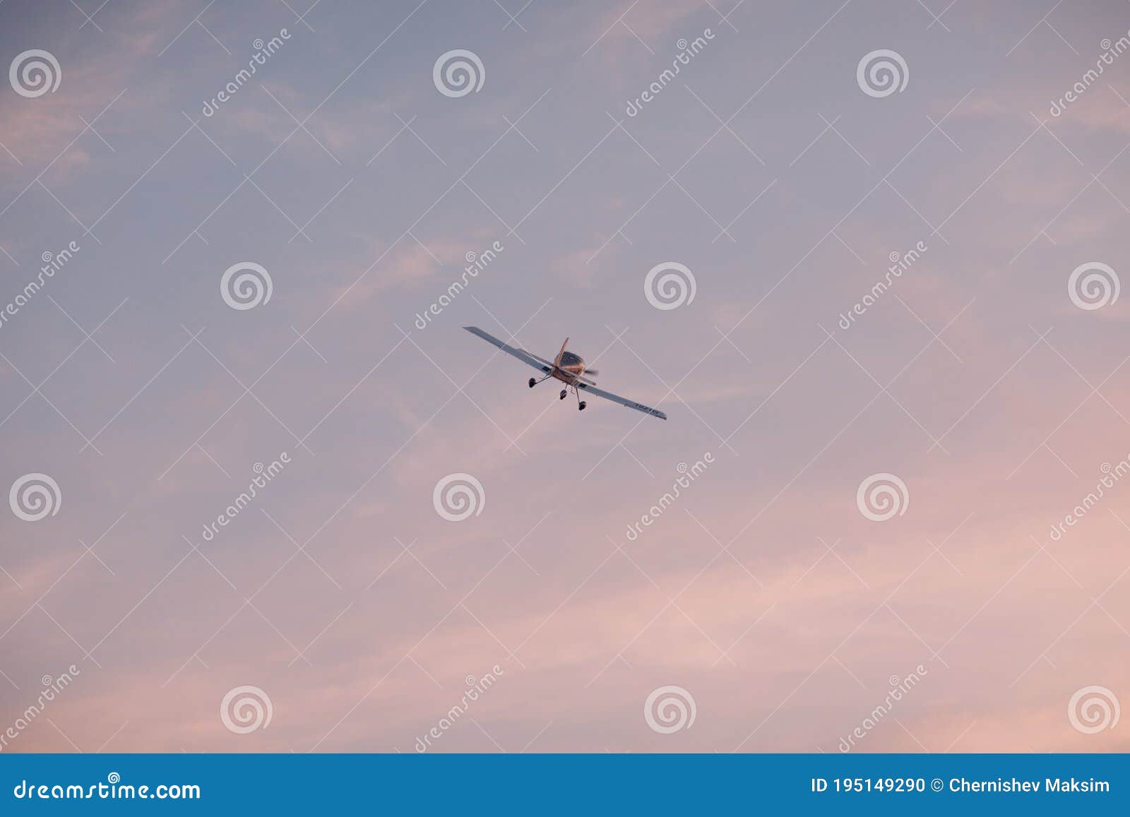 Small Single Engine Airplane Flying Against Sunset Sky Stock Photo ...