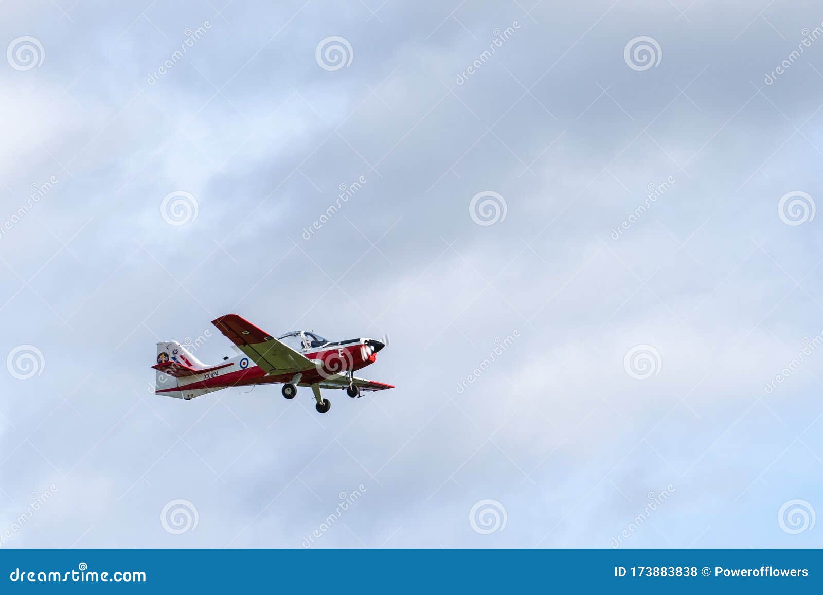 Small Single Engine Airplane Flying in the English Cloudy Sky Editorial ...