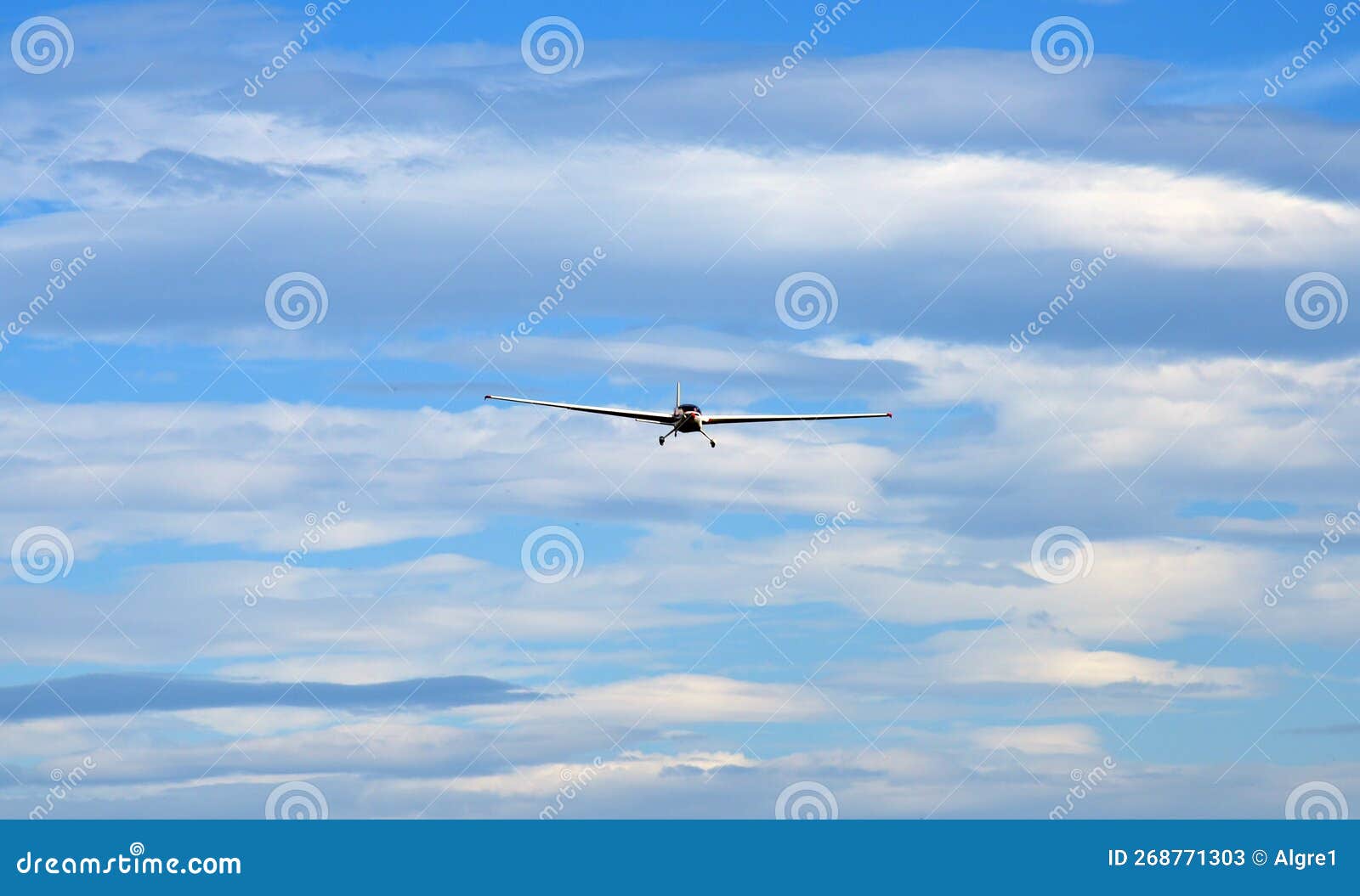 A Small Single Engine Aircraft Flying in the Blue Sky Stock Image ...