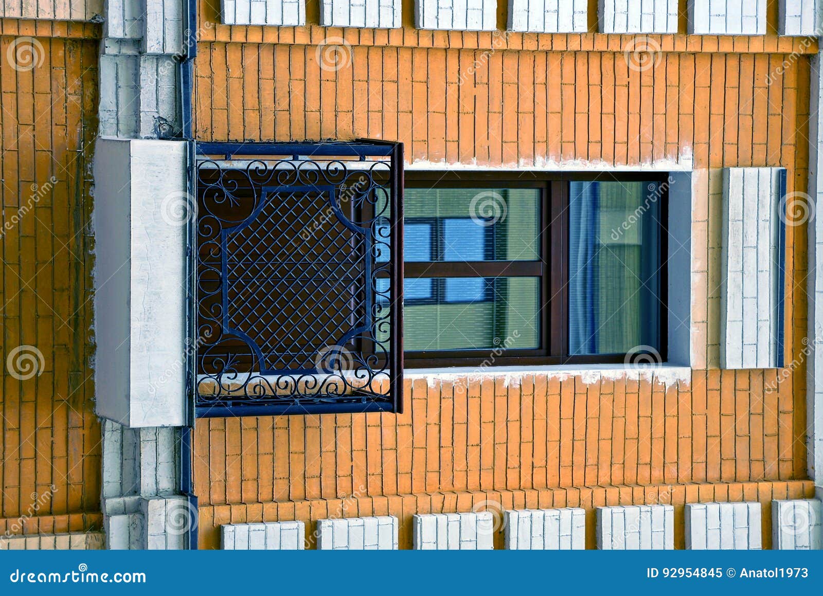 A Small Square Balcony and a Door with a Window on the Wall of a Modern ...