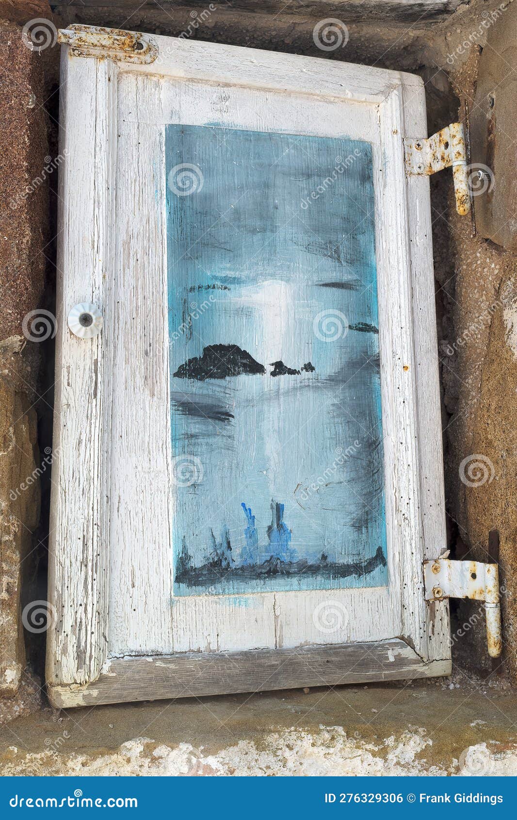 A Small Square Window Door Shutter in Kassiopi Corfu Stock Photo ...