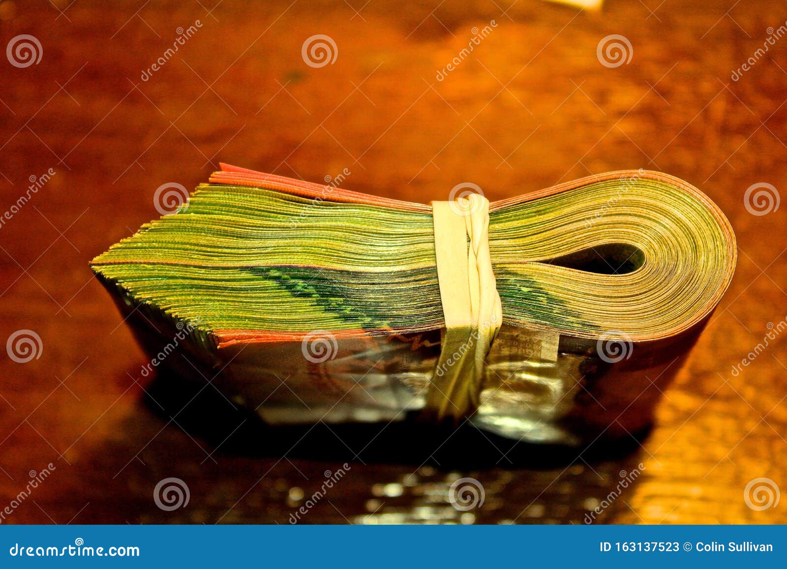 A Stack Of Canadian One Hundred Dollar Bills Stock Photo ...