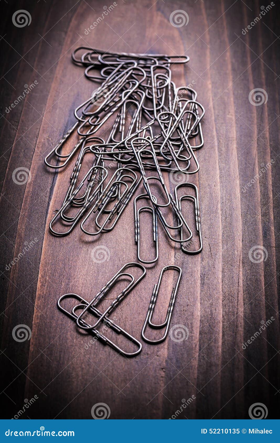 Small Stack of Classic Paperclips on Vintage Stock Image - Image of ...