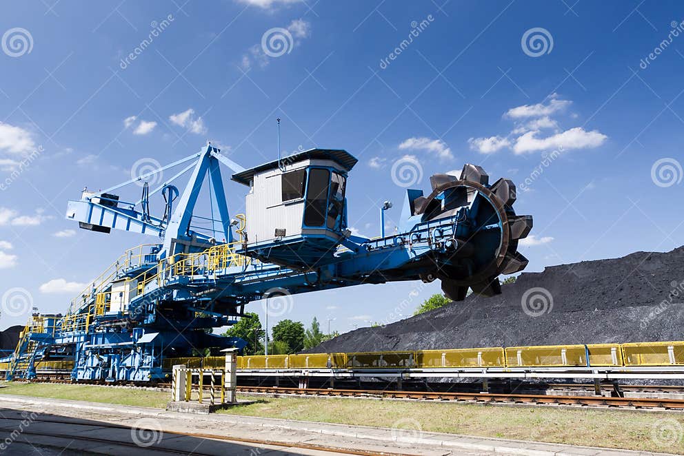 Small Stacker- reclaimer stock image. Image of stockpile - 25851859