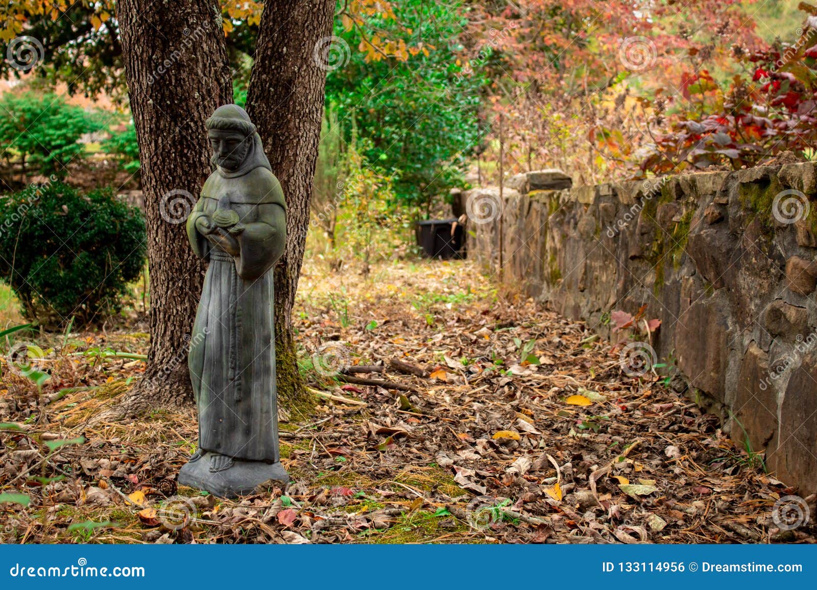 Statue of a Catholic Monk in the Garden Stock Photo - Image of garden ...