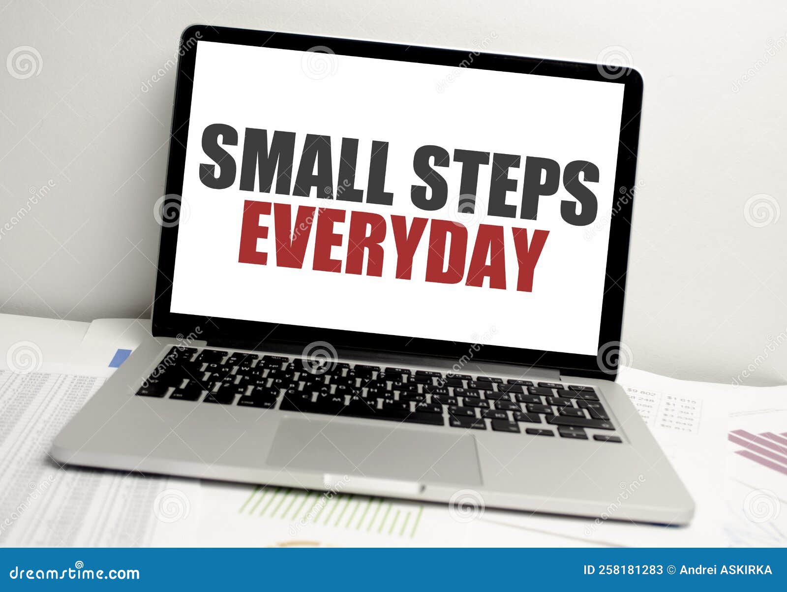 Small Steps Everyday Word on Laptop with Charts Stock Image - Image of ...