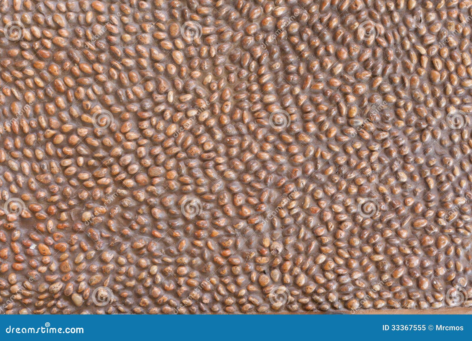 Small Stone in Cement Wall stock image. Image of black - 33367555