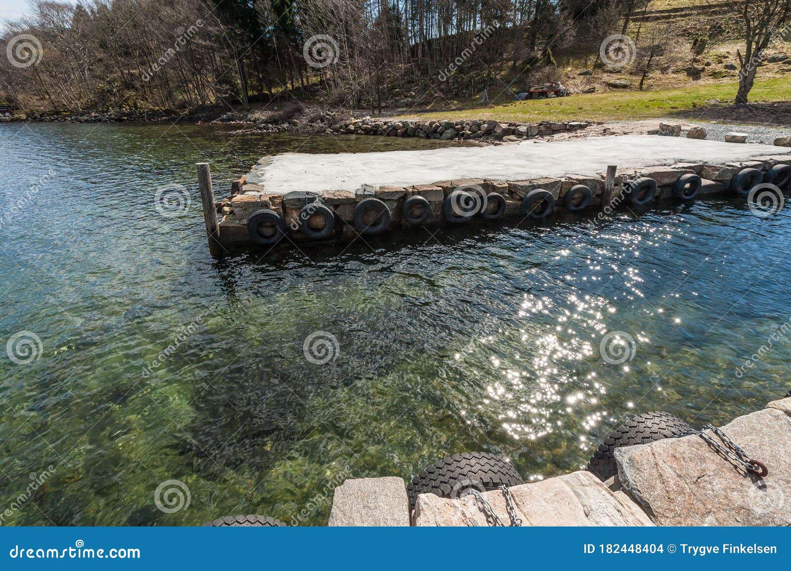 Small Stone Dock and Clear Water Stock Photo - Image of blue, ancient ...