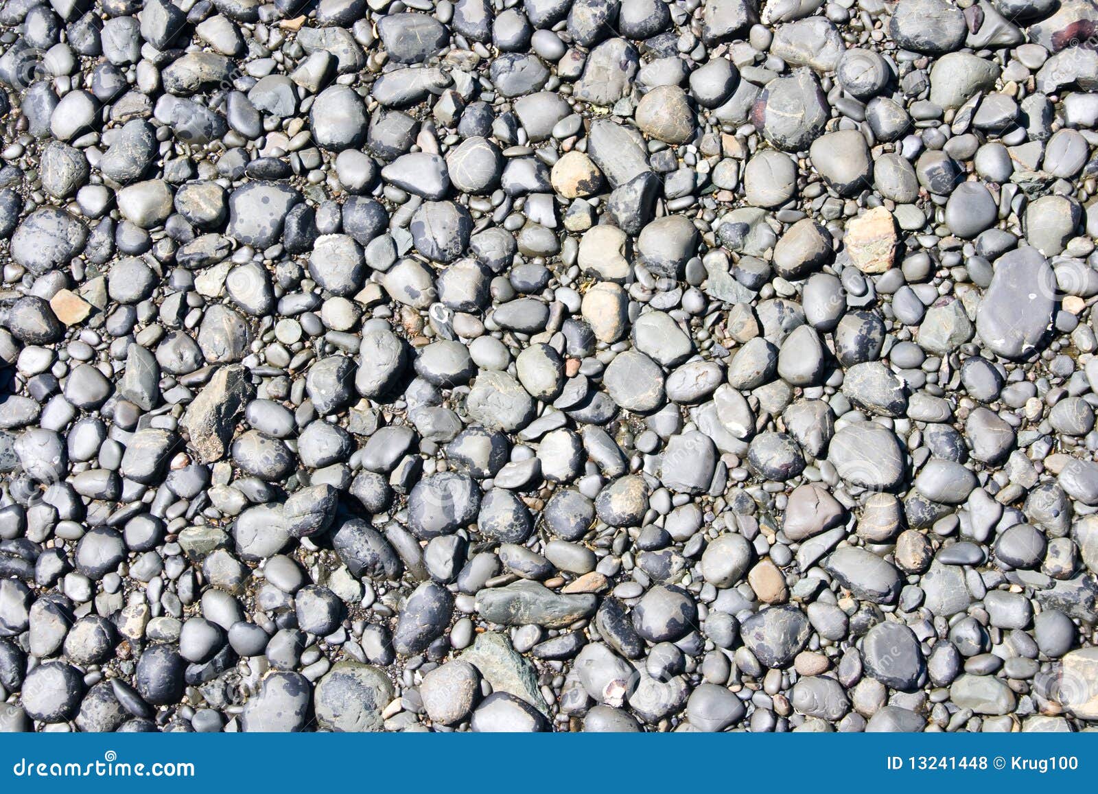 Small stones on a beach stock photo. Image of tide, sand - 13241448