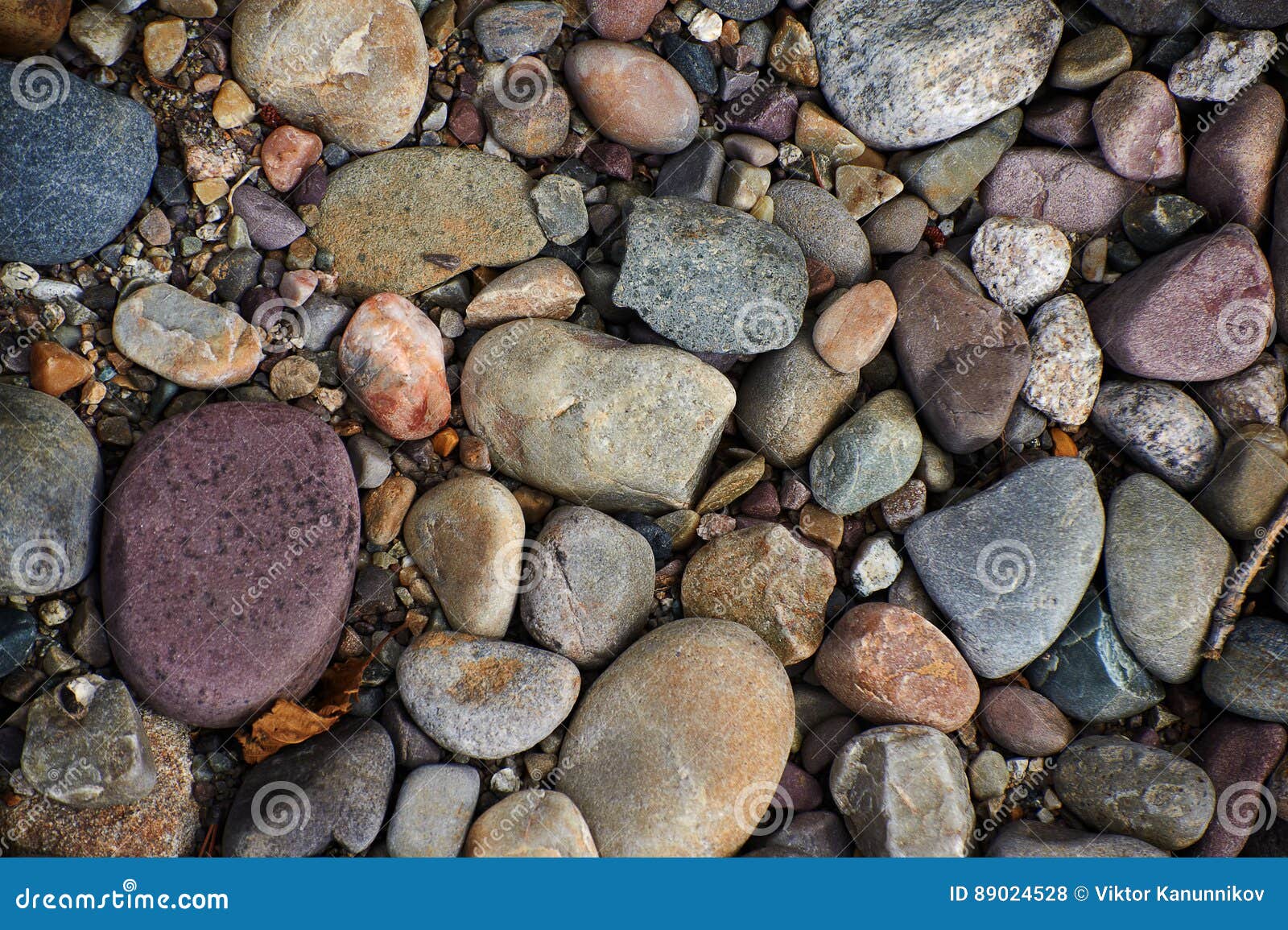 Small stones on the ground stock photo. Image of sand - 89024528