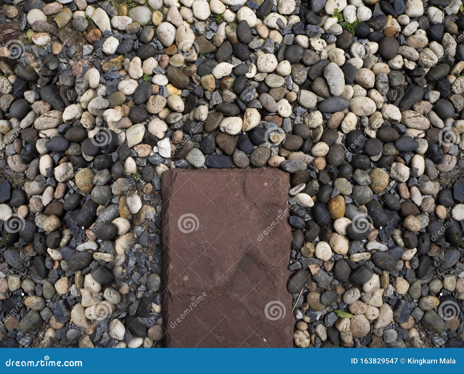 Small Stones Placed Around a Large Rock Stock Image - Image of closeup ...